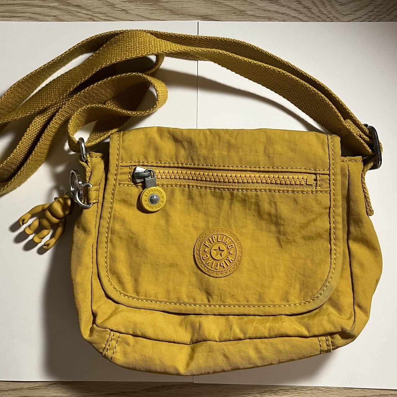 Yellow Mustard Kipling small bag. On the outside... - Depop