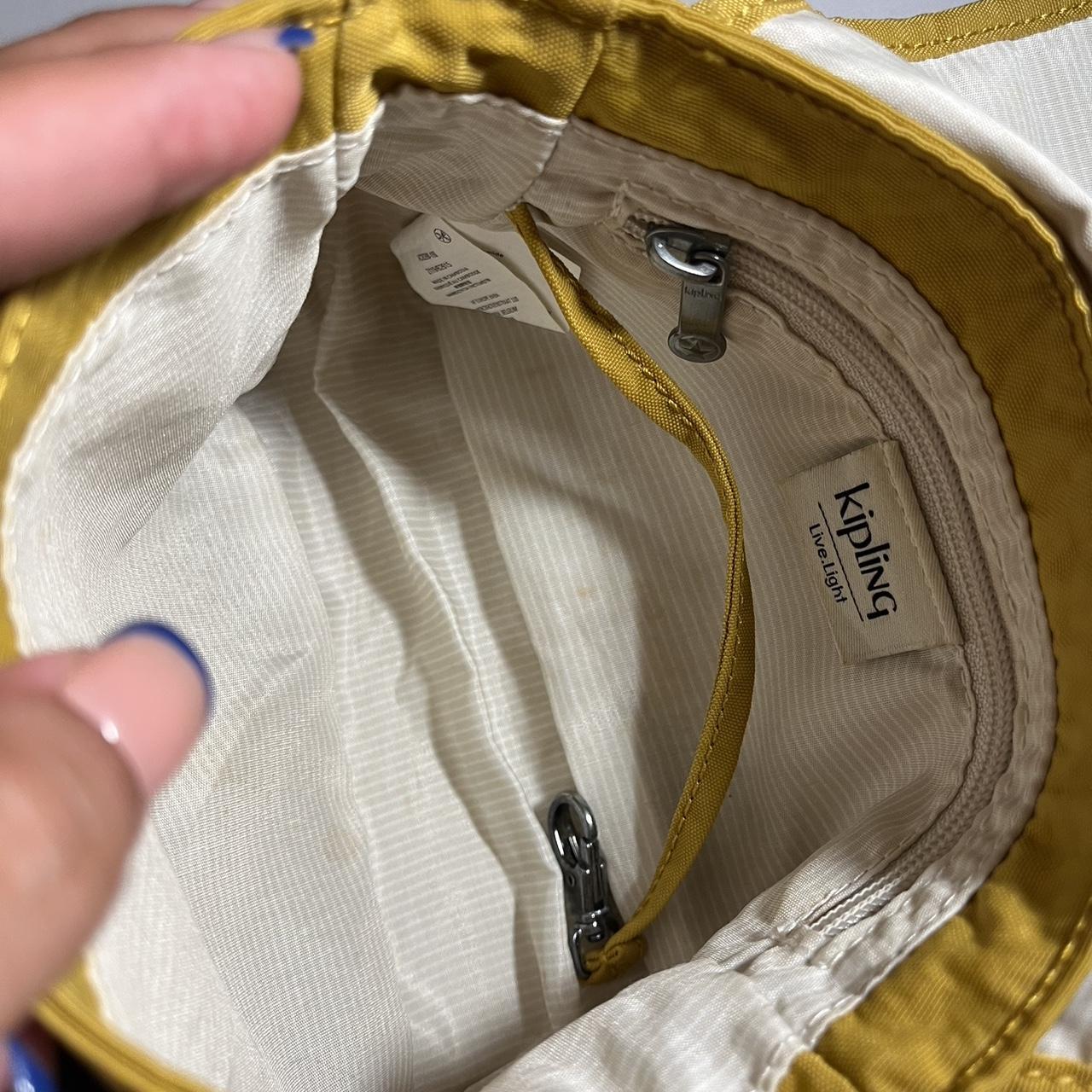 Yellow Mustard Kipling small bag. On the outside... - Depop