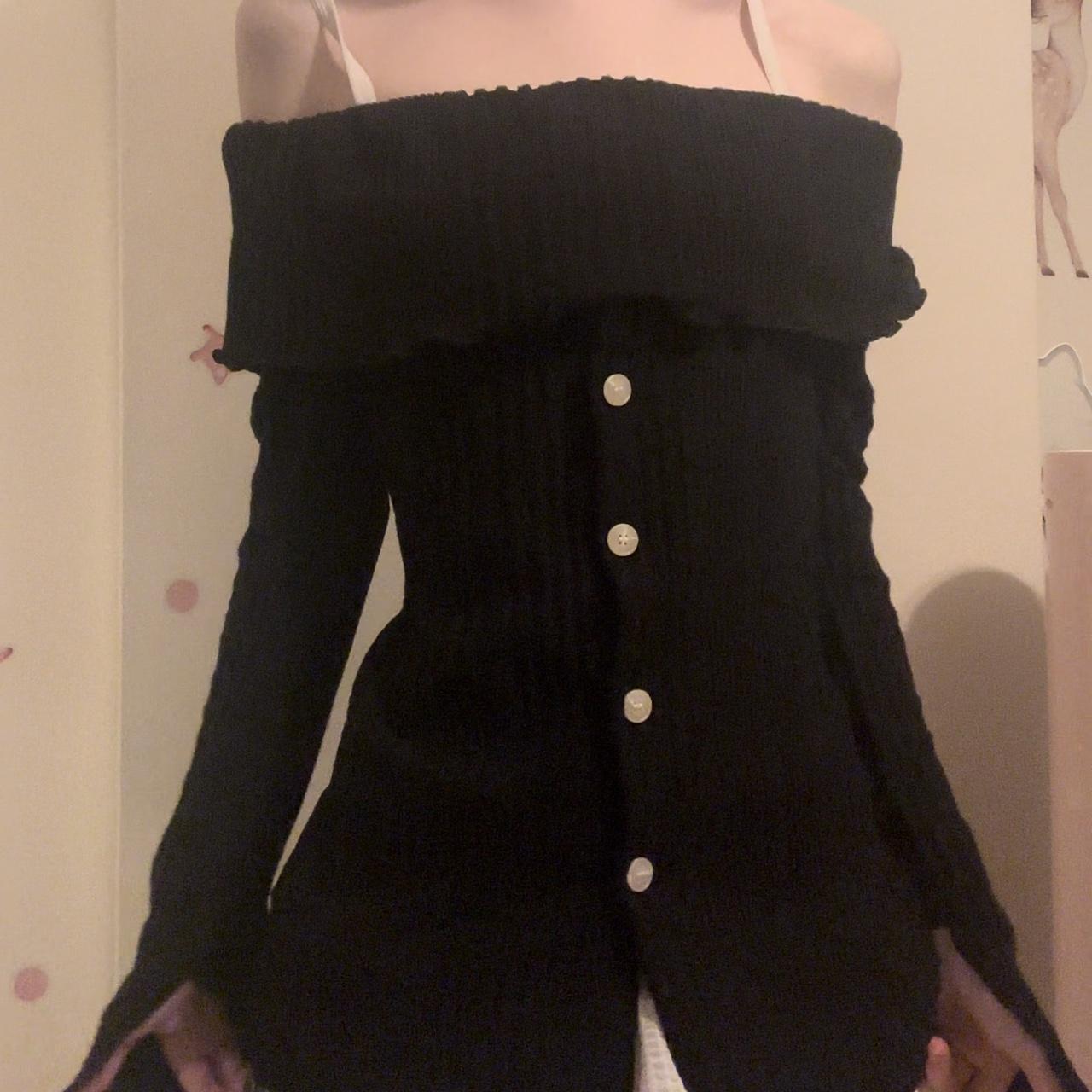 warm black shoulder-less shirt🩷 it has never been... - Depop