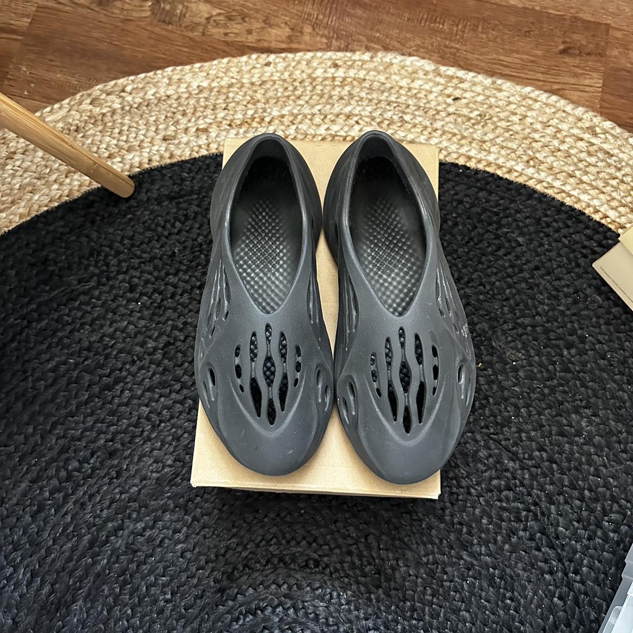 YZY Foam Runners Onyx SZ 11 but closer to a true... - Depop