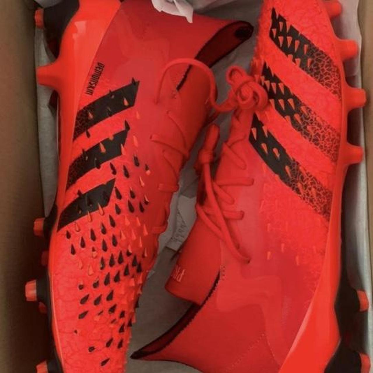 Predator freak .3 red and black plastic studs. Size... - Depop