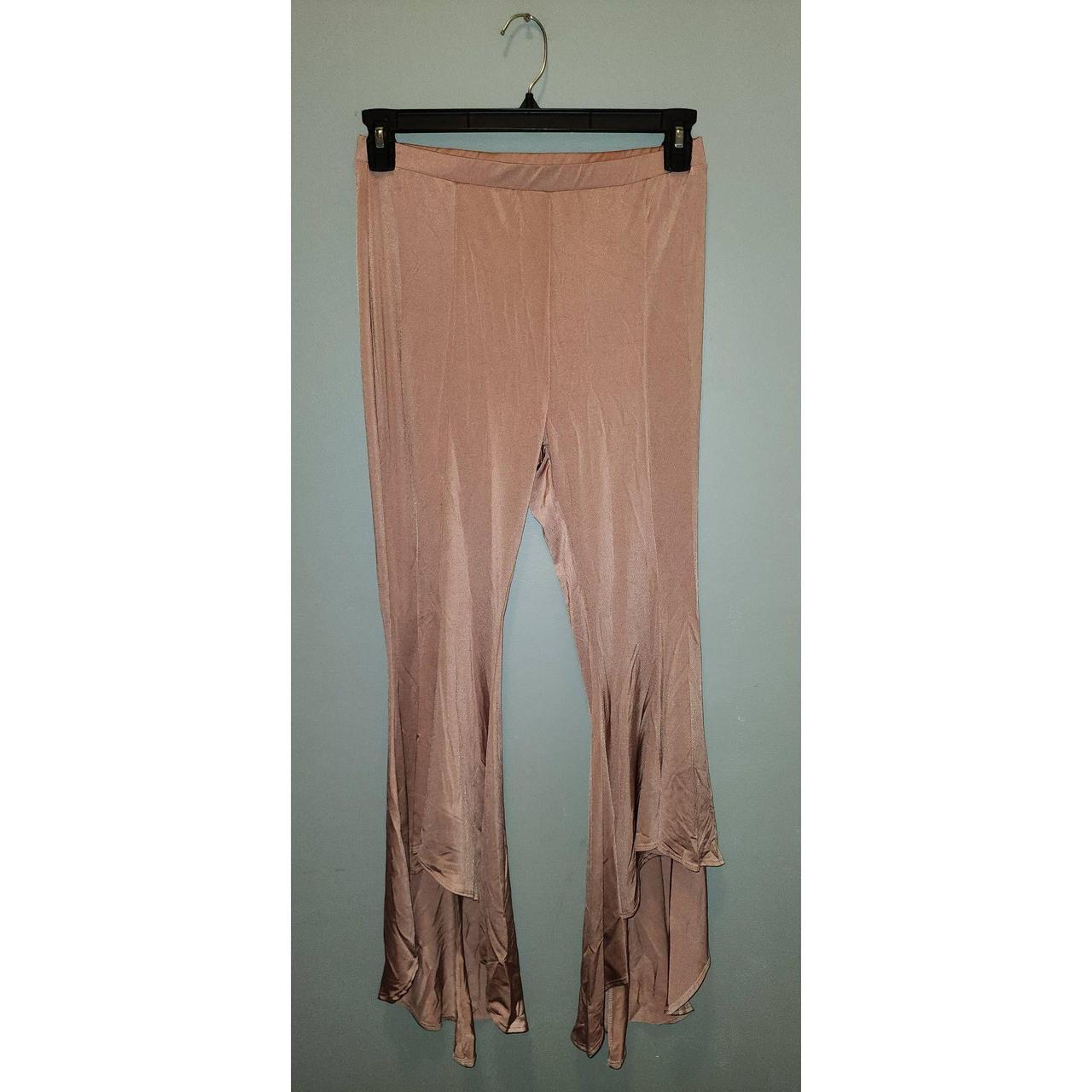 Pull on style rose gold colored pants have hi low... - Depop