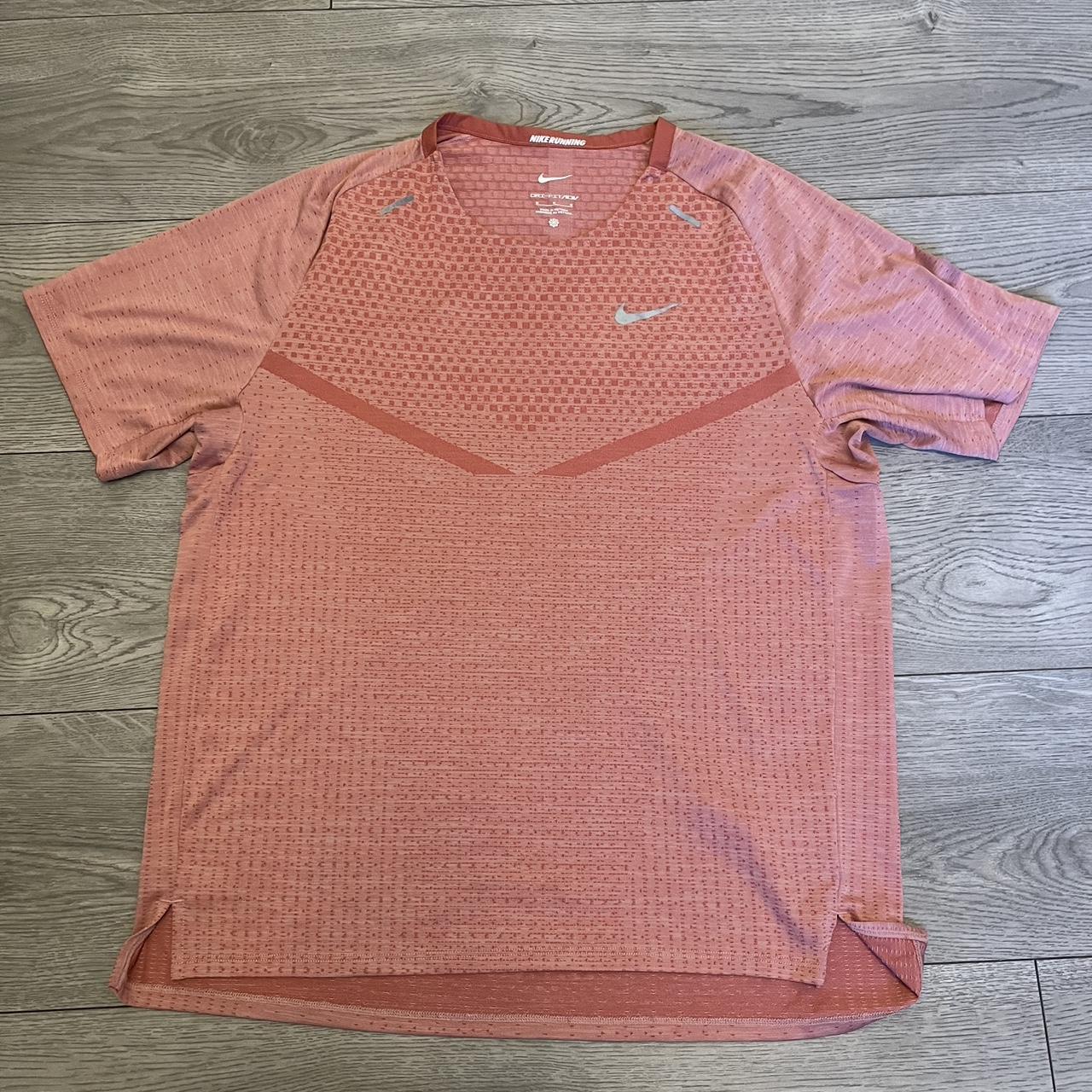 Nike dry fit tee Samon pink worn hand full of times - Depop