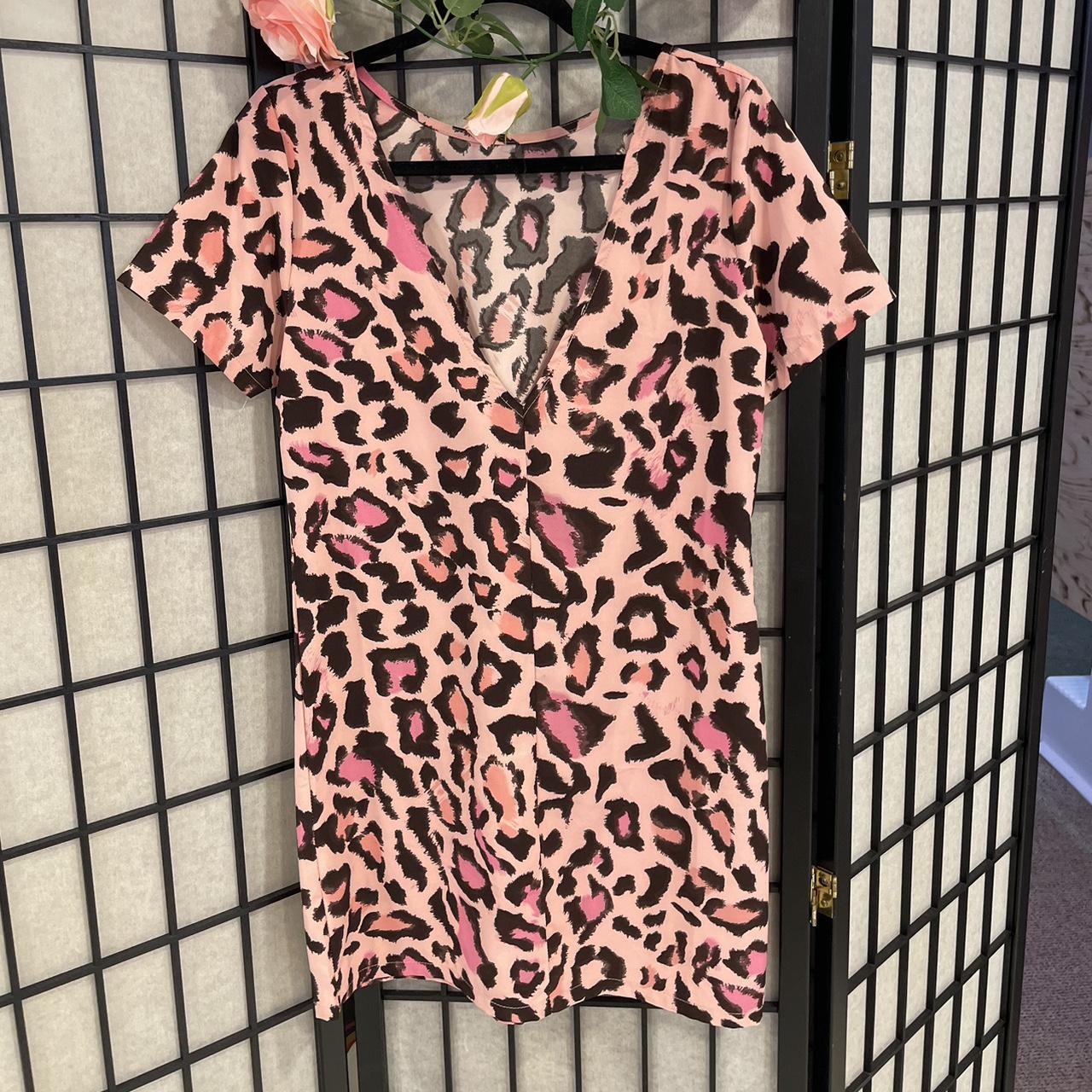 Long, pink leopard print y2k top. No tag. Fits like... - Depop