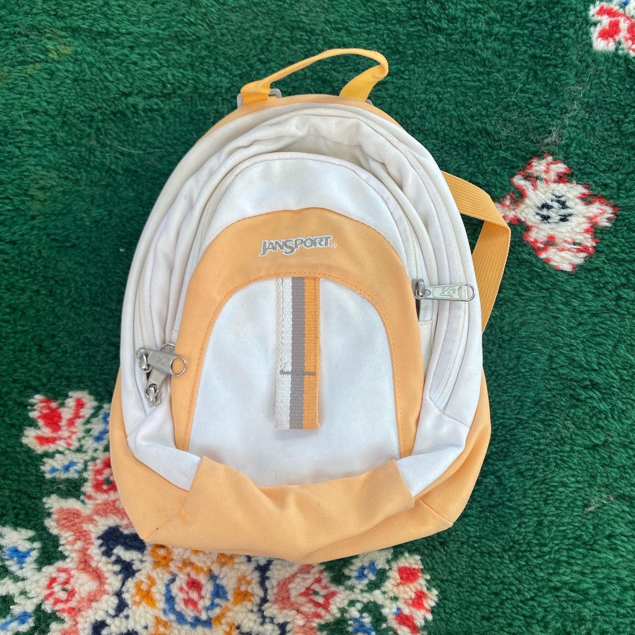 Jansport mini backpack in orange and white with a... - Depop