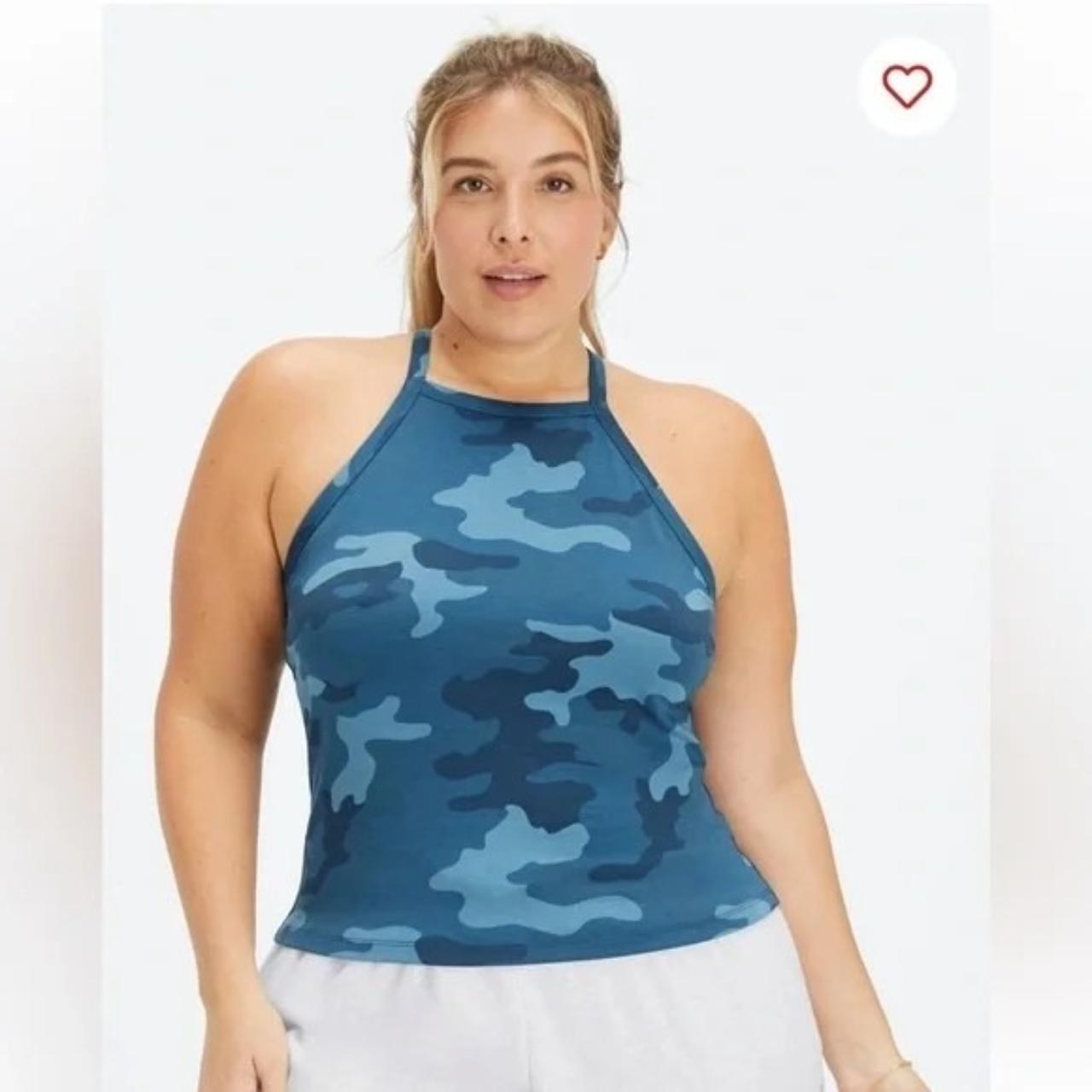 Cute tank top from Fabletics. This has a higher neck... - Depop