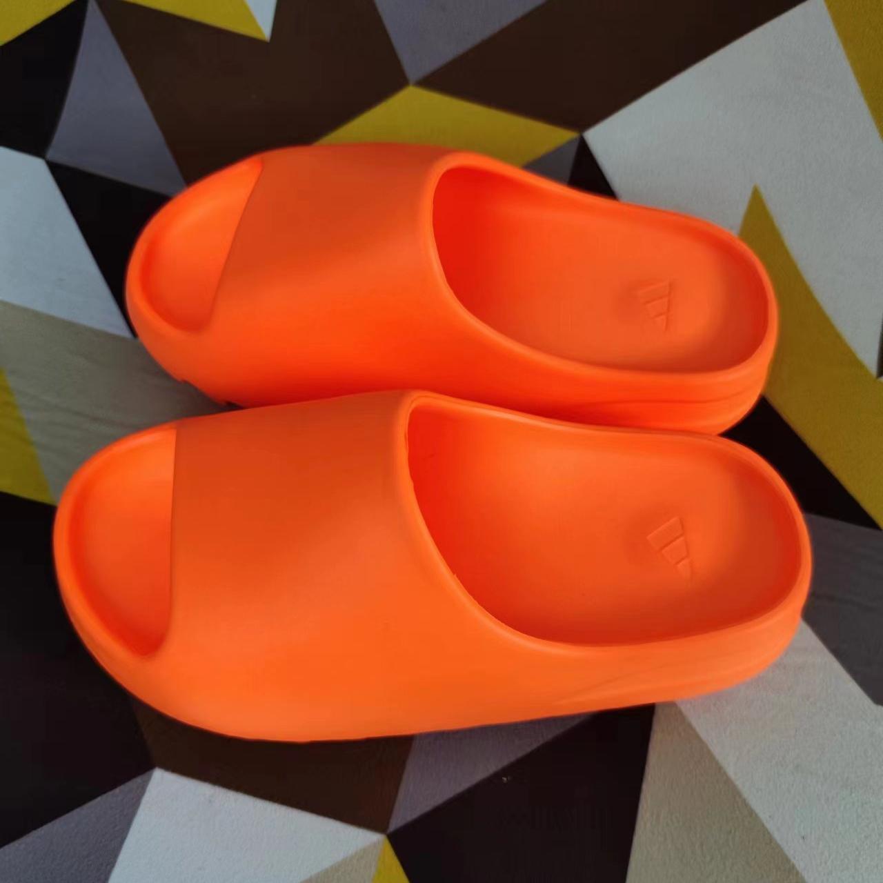 Adidas Women's Orange Slides | Depop