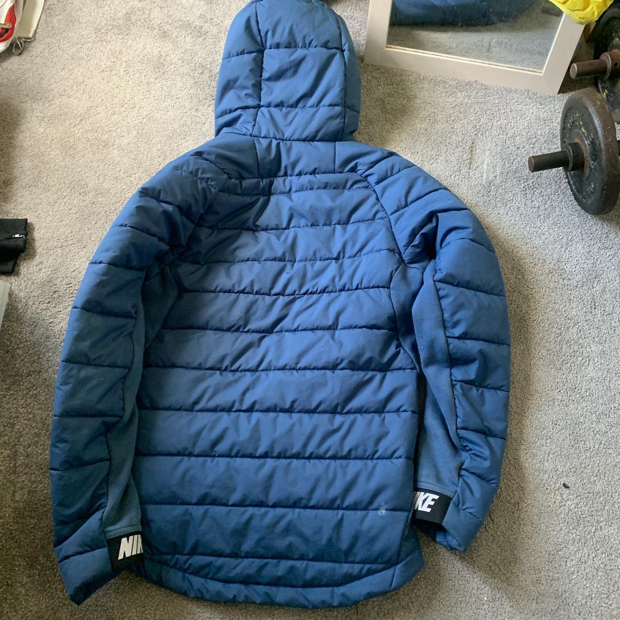 Blue Nike puffer, payed £100 last year and hardly... - Depop