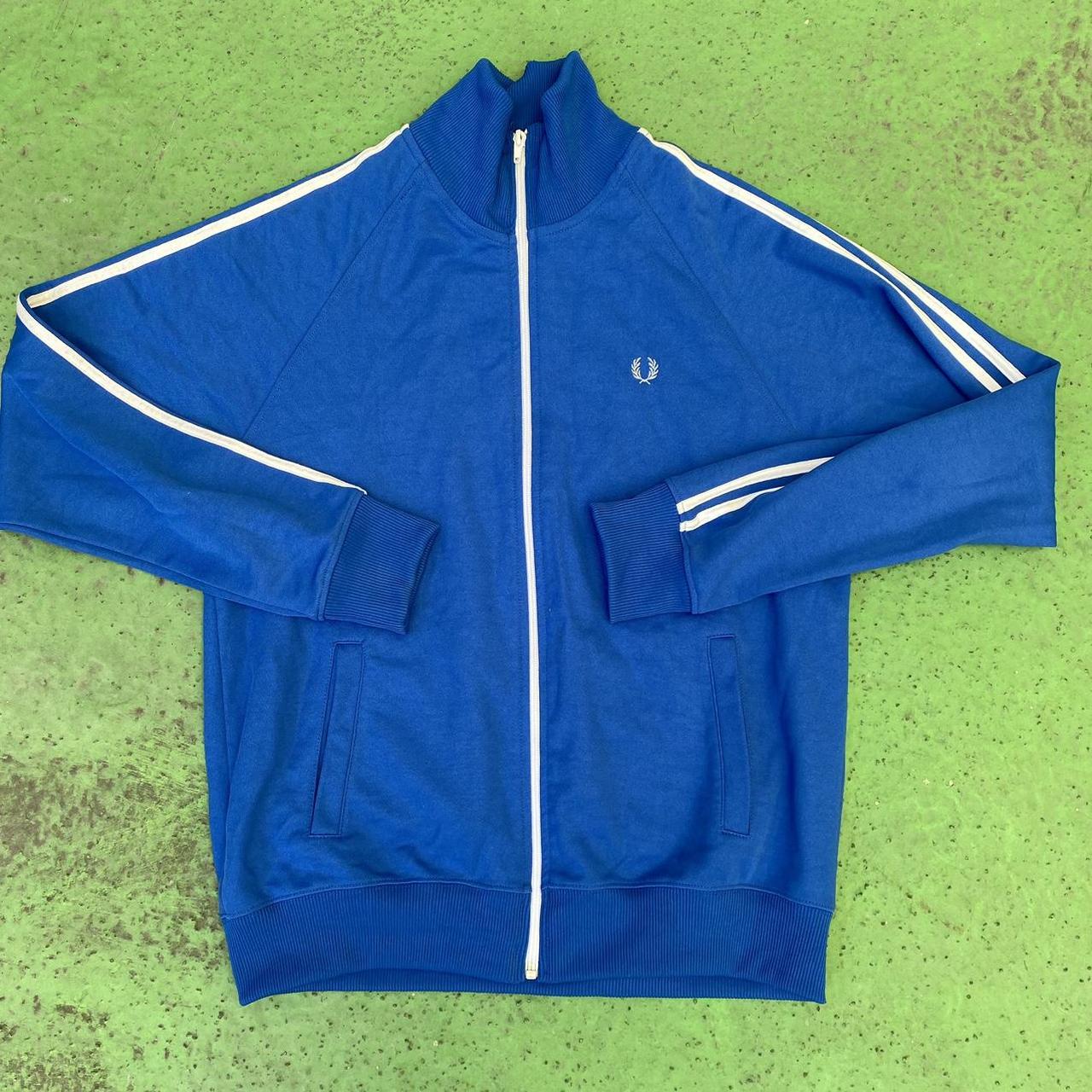 Size medium Fred Perry track jacket. Bright blue.... - Depop