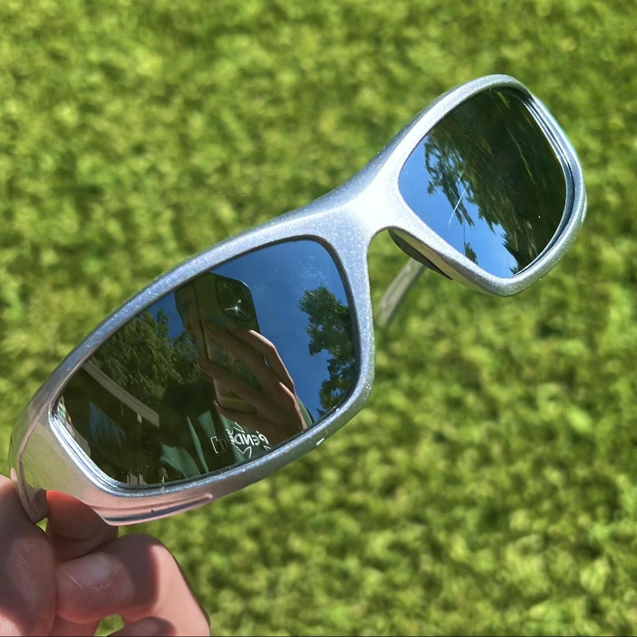Silver Y2k sunglasses with mirrored lens and rubber... - Depop