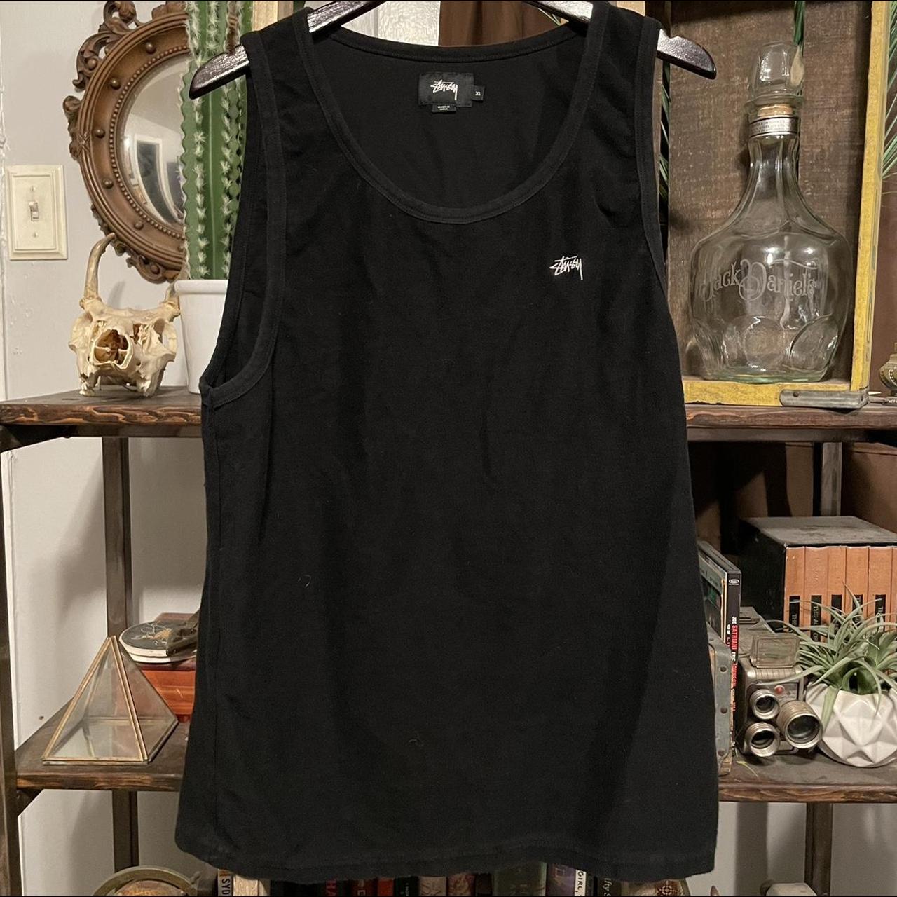 Stussy black tank top. Good condition. Size... - Depop