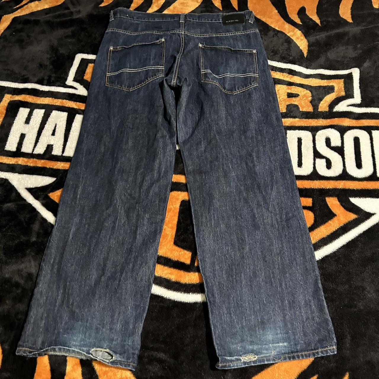 Hella baggy early 2000s ecko unlimited jeans with a... - Depop