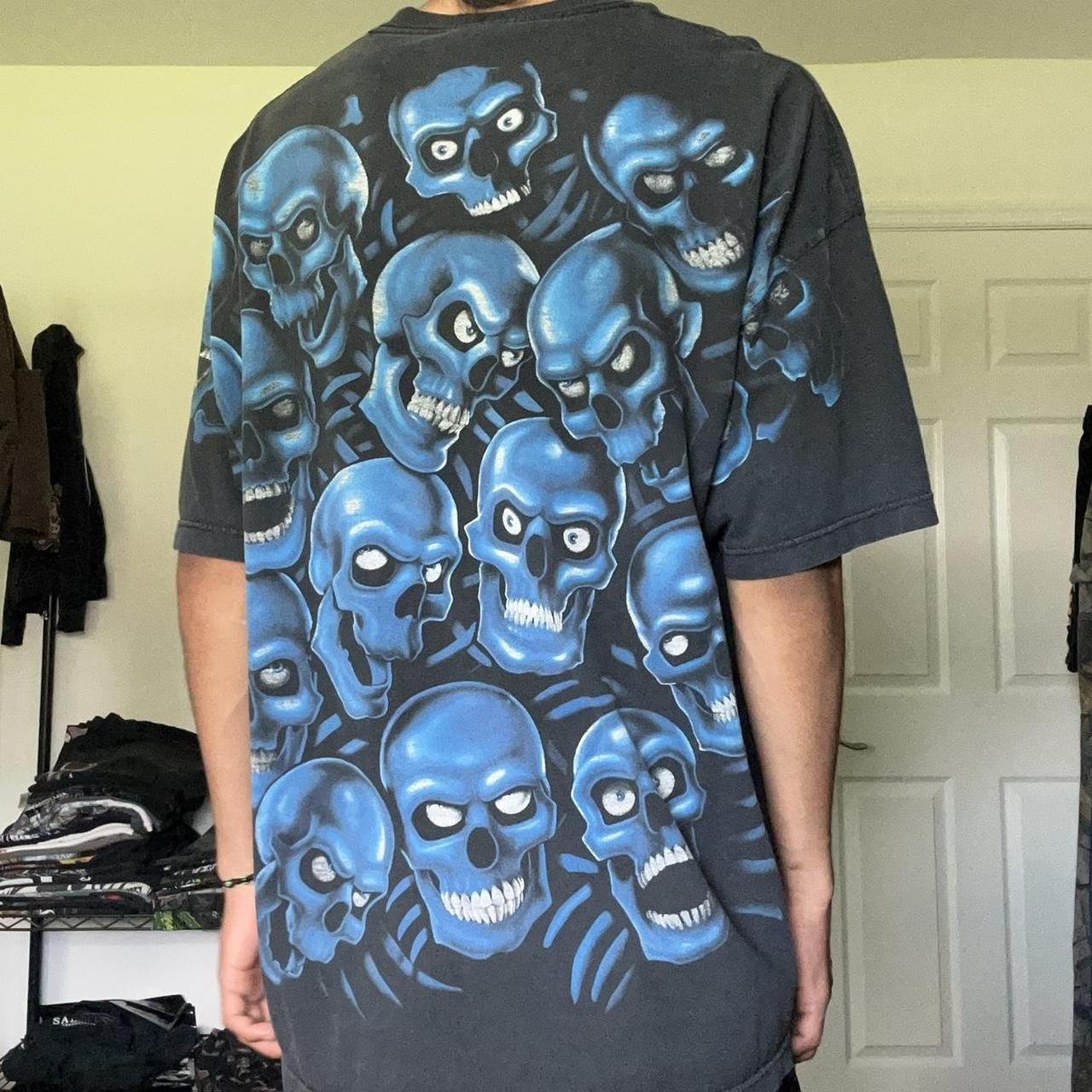 Vintage Liquid blue aop skulls with tribal cuts and... - Depop