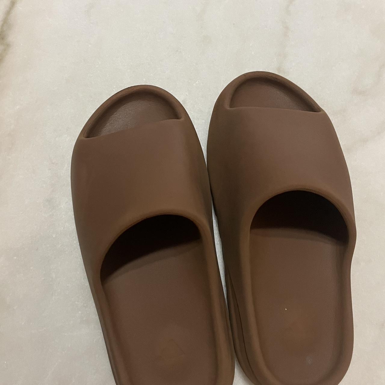 Orche brown yeezy slides size 10 good condition... - Depop