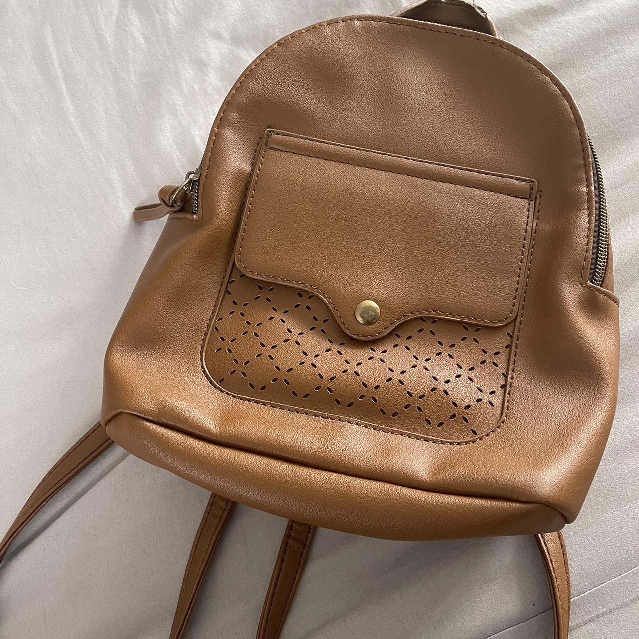Brown Mini Backpack Super cuteee used many times... - Depop