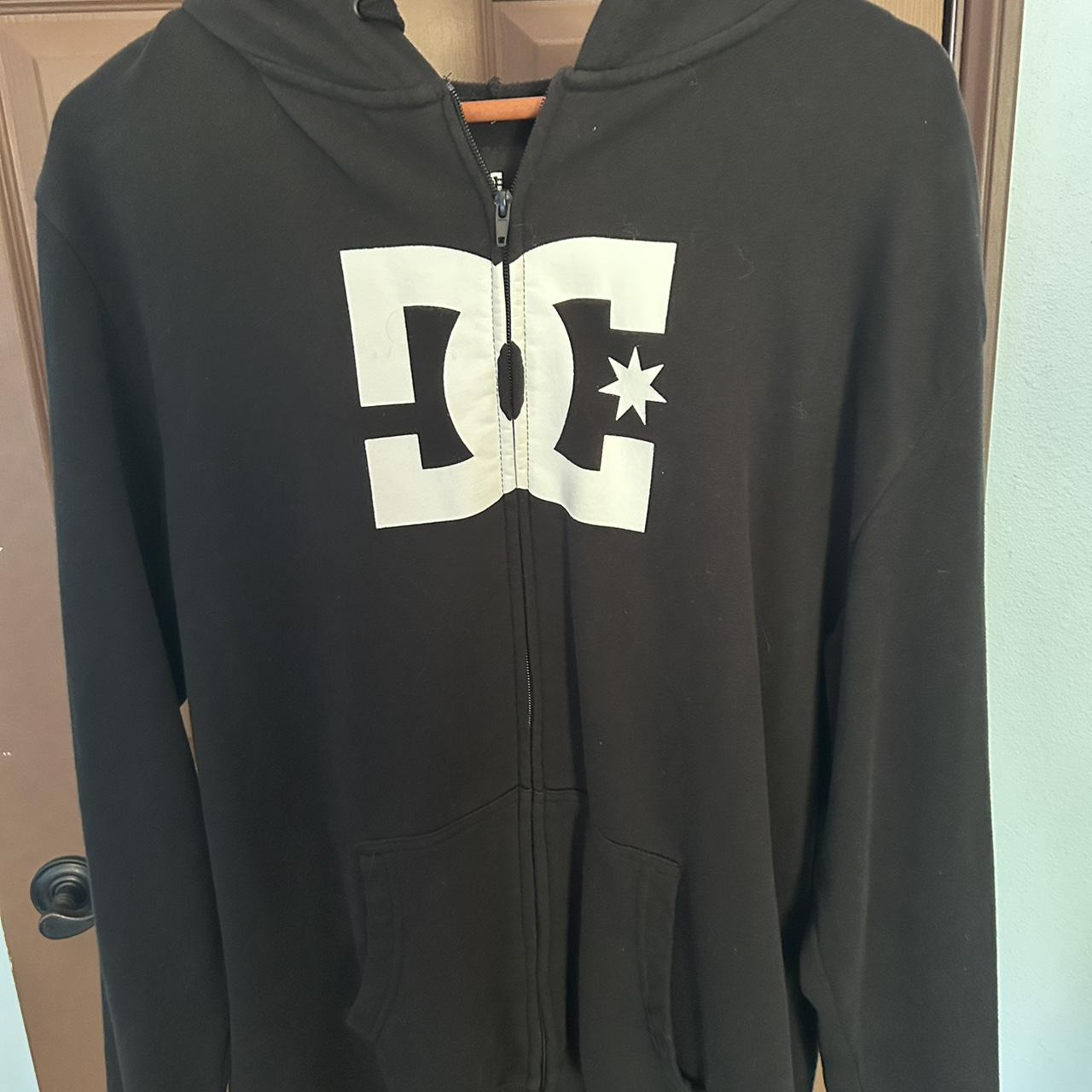 DC zip up hoodie worn a few times. Size L but fits a... - Depop