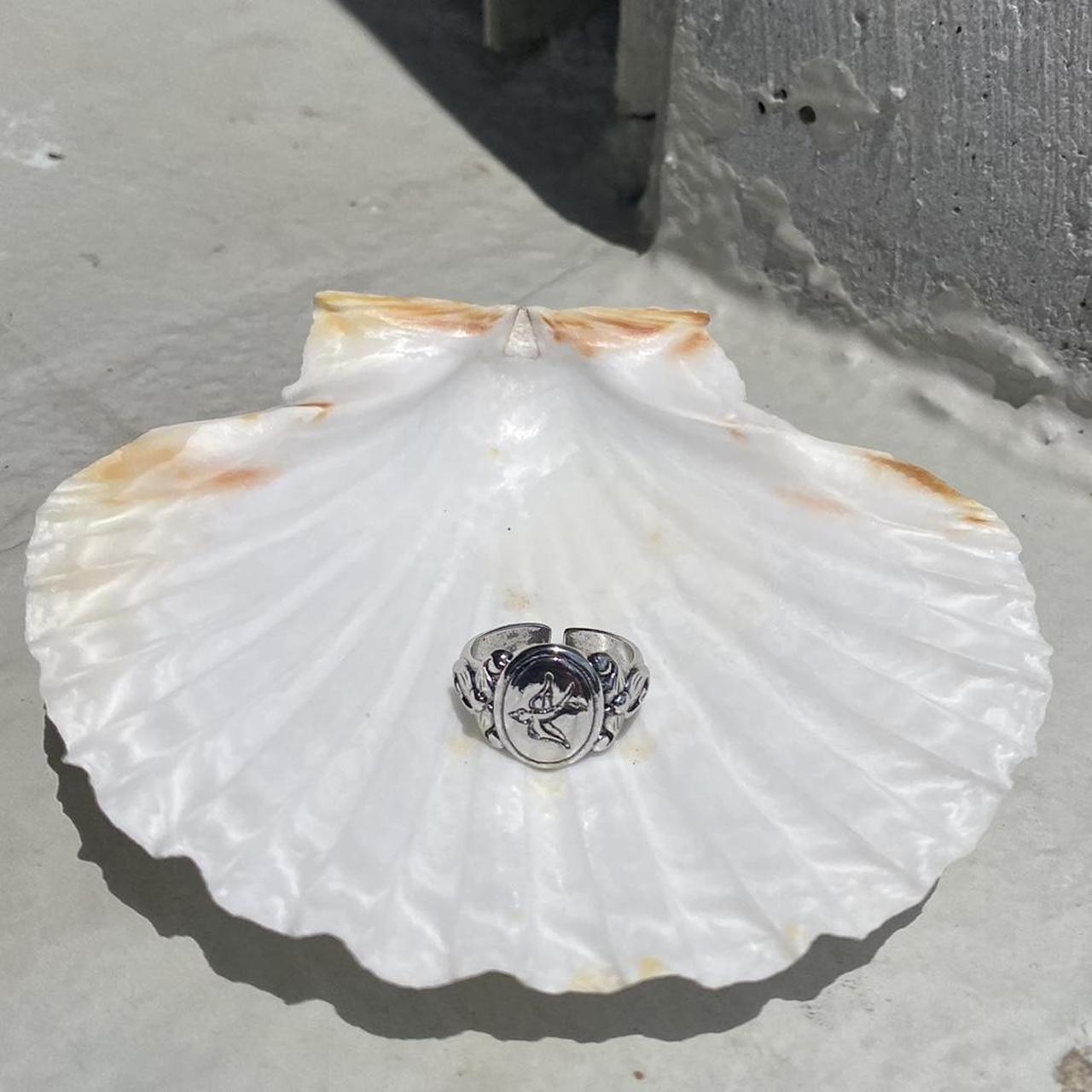 Silver shell ring with a touch of boho charm #shellring - Depop