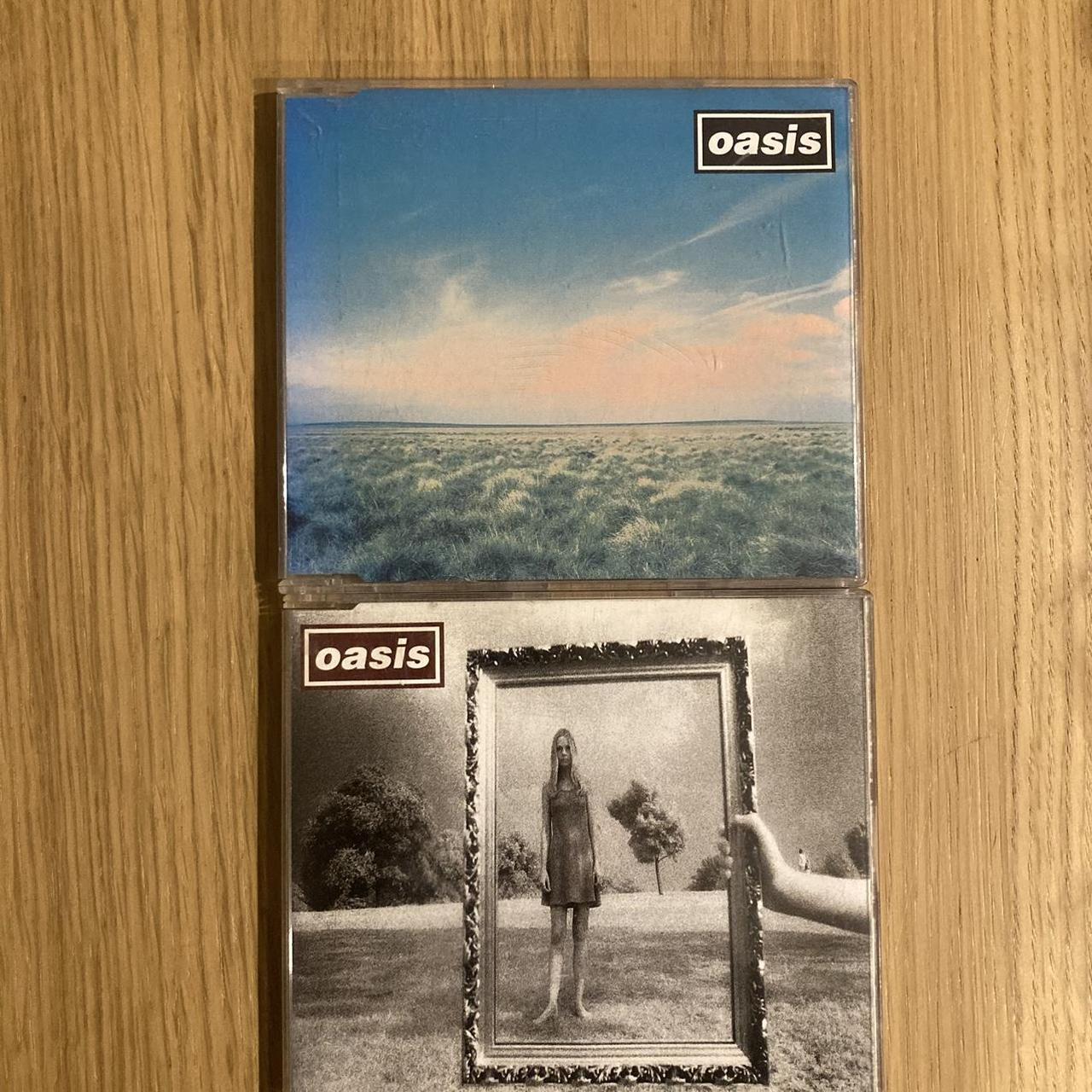 Oasis. 2 x 4 track CDs including ‘Wonderwall’ and... - Depop