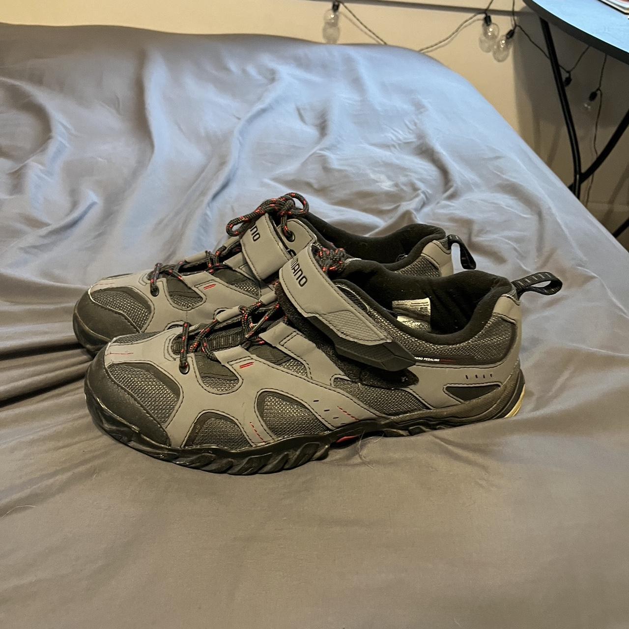 Grey and black hiking/biking shimano shoes... - Depop