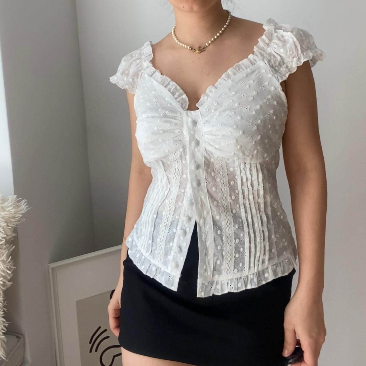 Your go-to top, white-ish/cream top featuring... - Depop