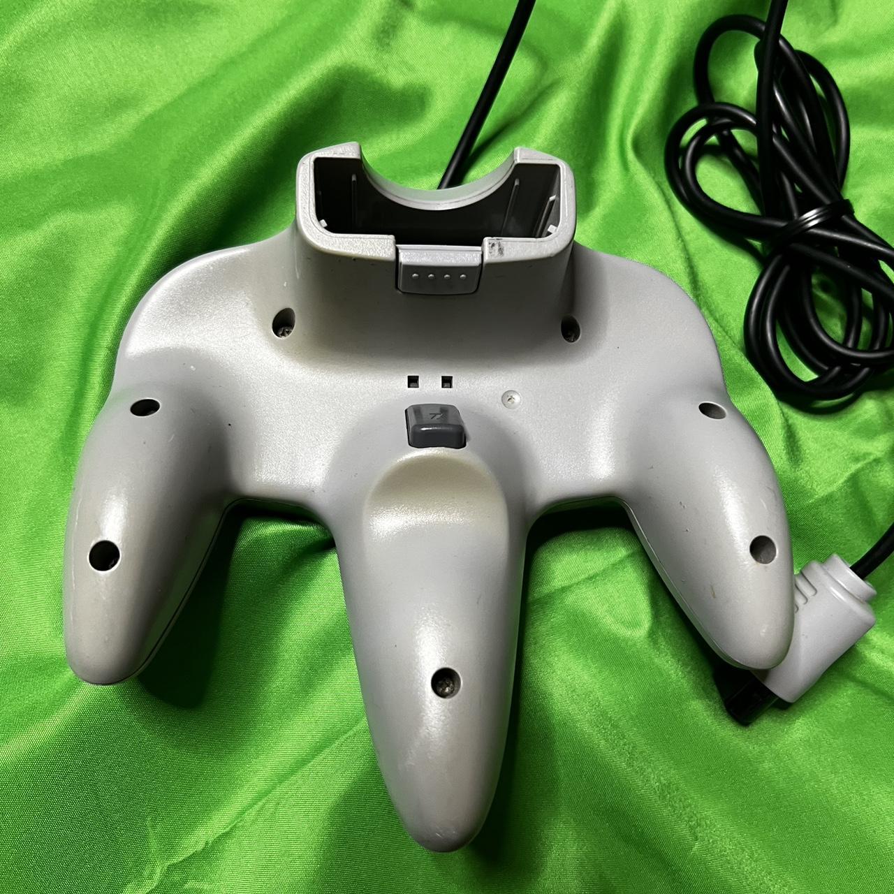 Grey Nintendo 64 controller with a few scratches... - Depop