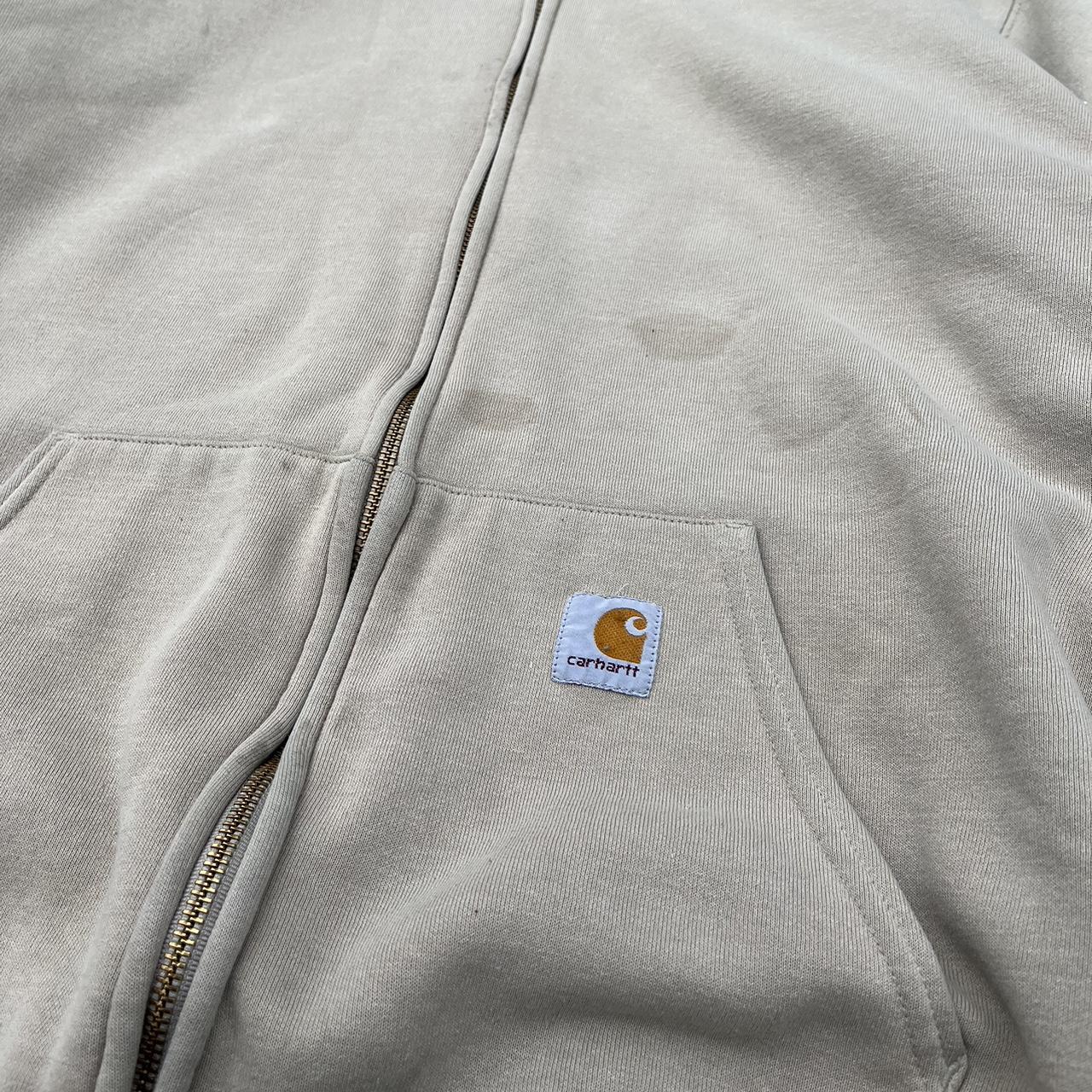 Tan/cream Carhartt zip up hoodie. Perfect pick up... - Depop