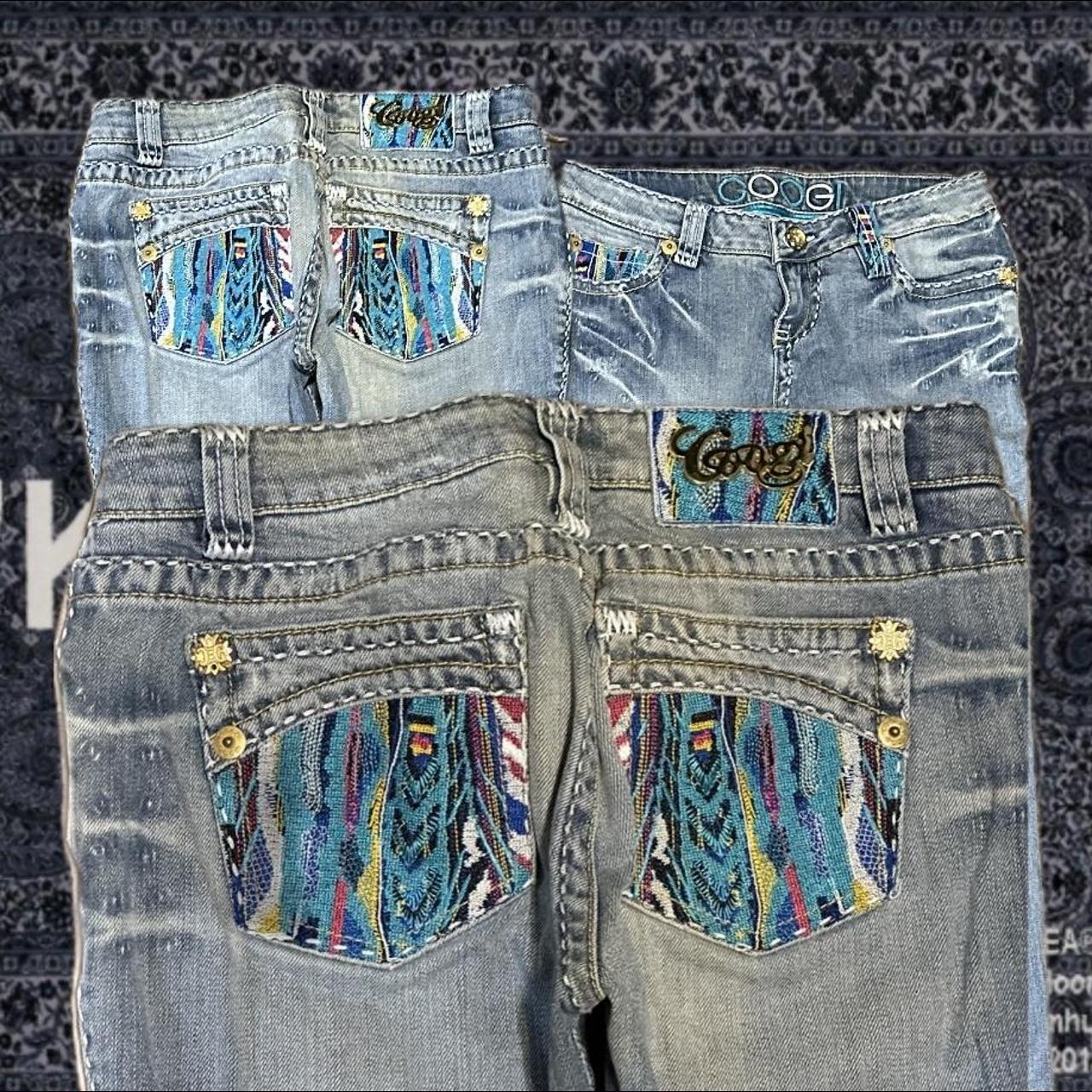 Coogi women’s distressed bootcut embroidered golden... - Depop
