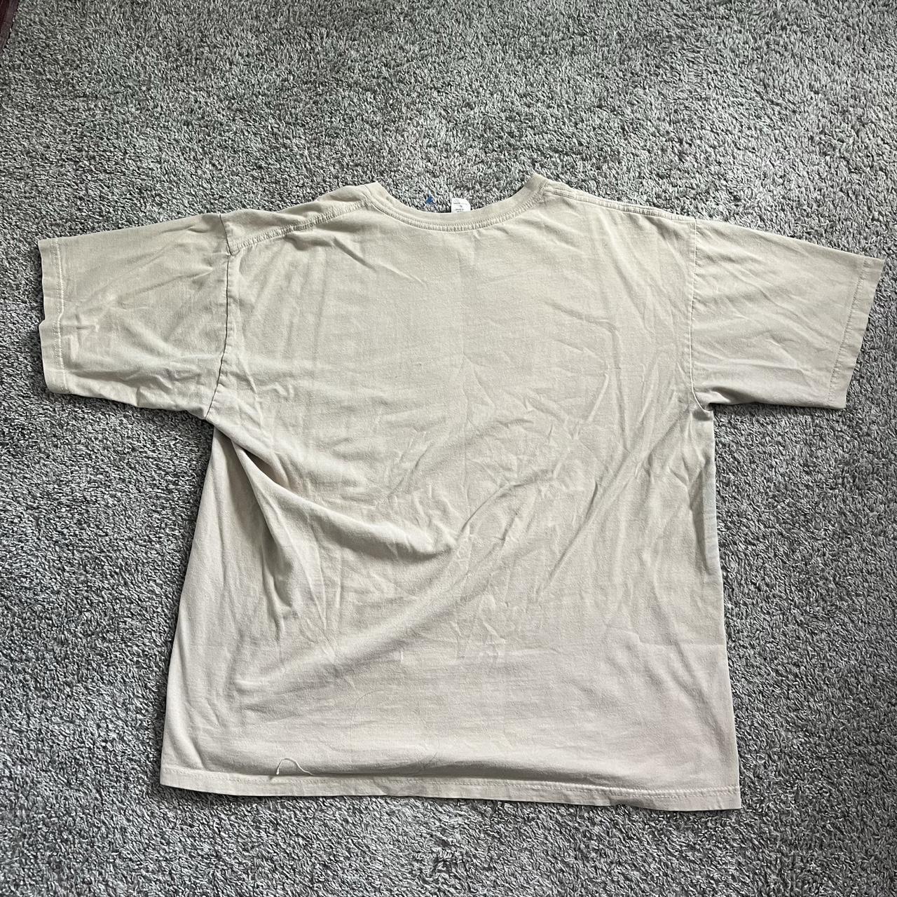 Super sick y2k tan skull tee, dm me with any... - Depop
