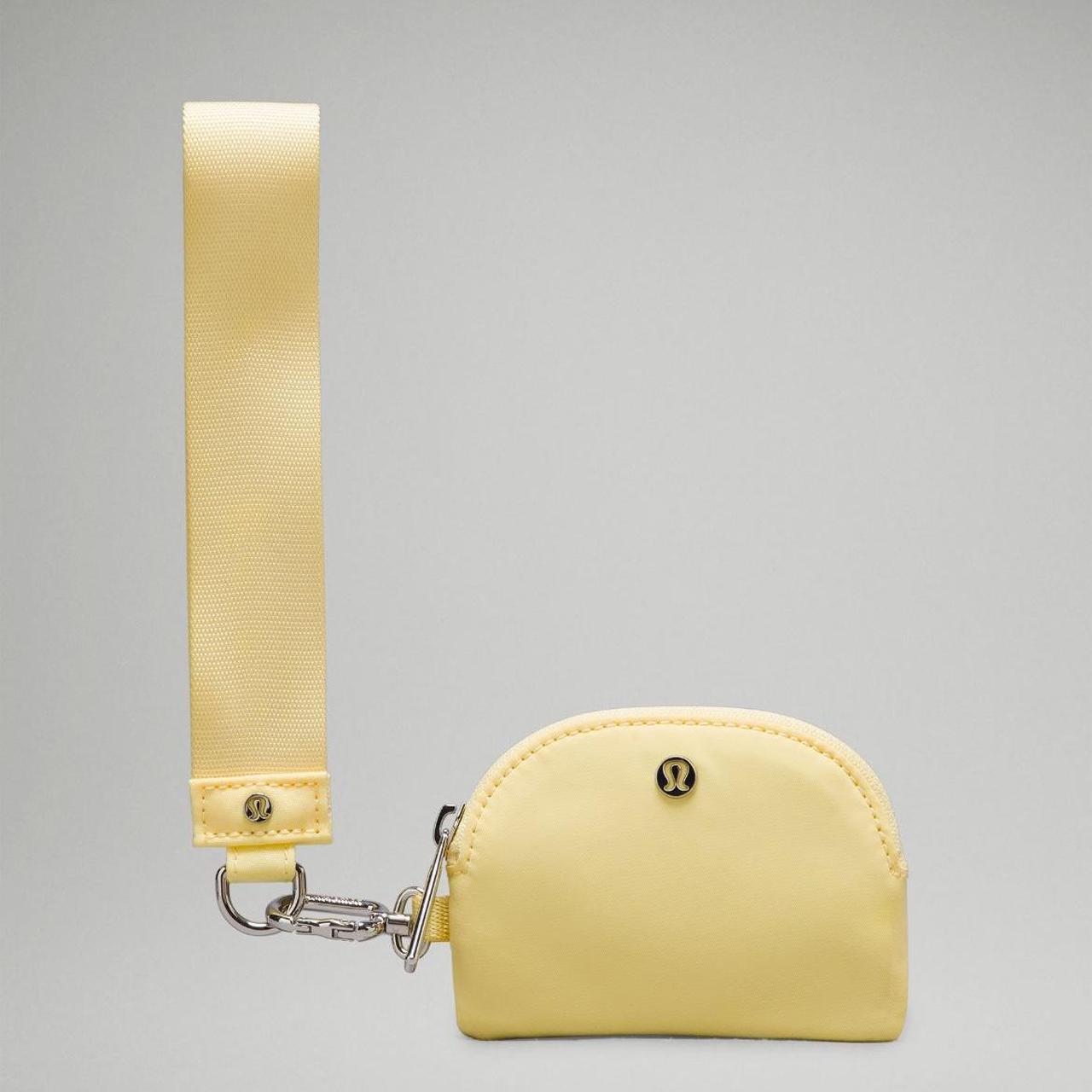 yellow lululemon wallet perfect condition - Depop