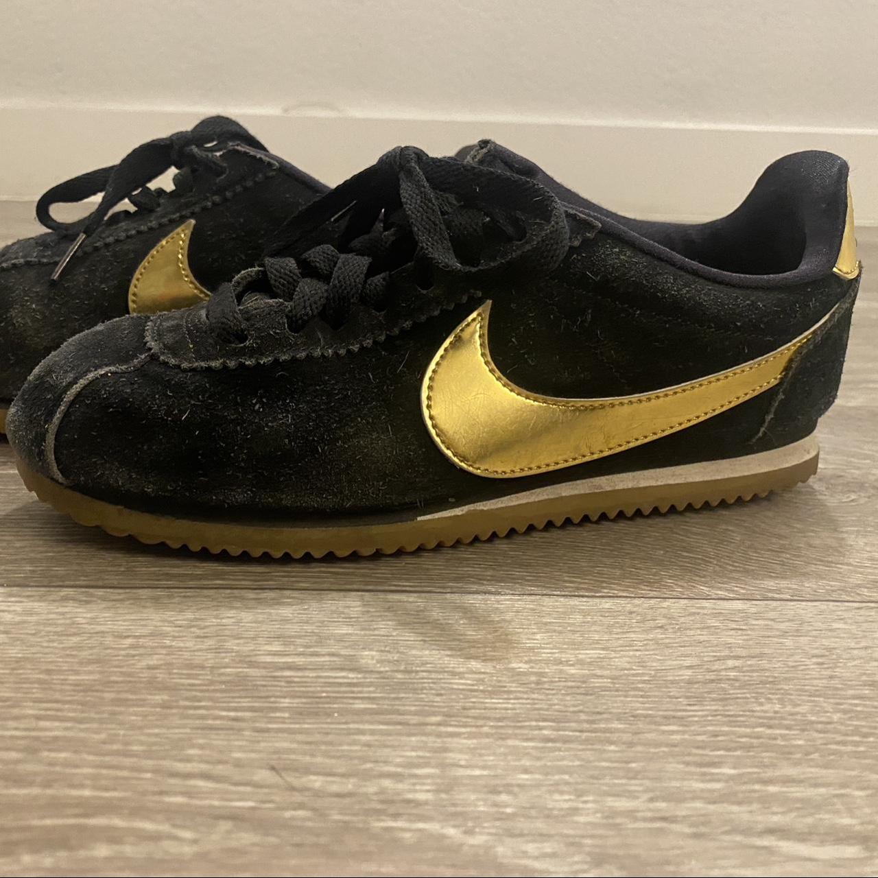 Women's Black and Gold Trainers | Depop