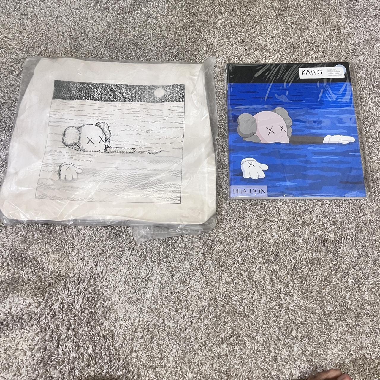 BRAND NEW DEADSTOCK KAWS TOTE AND ARTBOOK! Released... - Depop