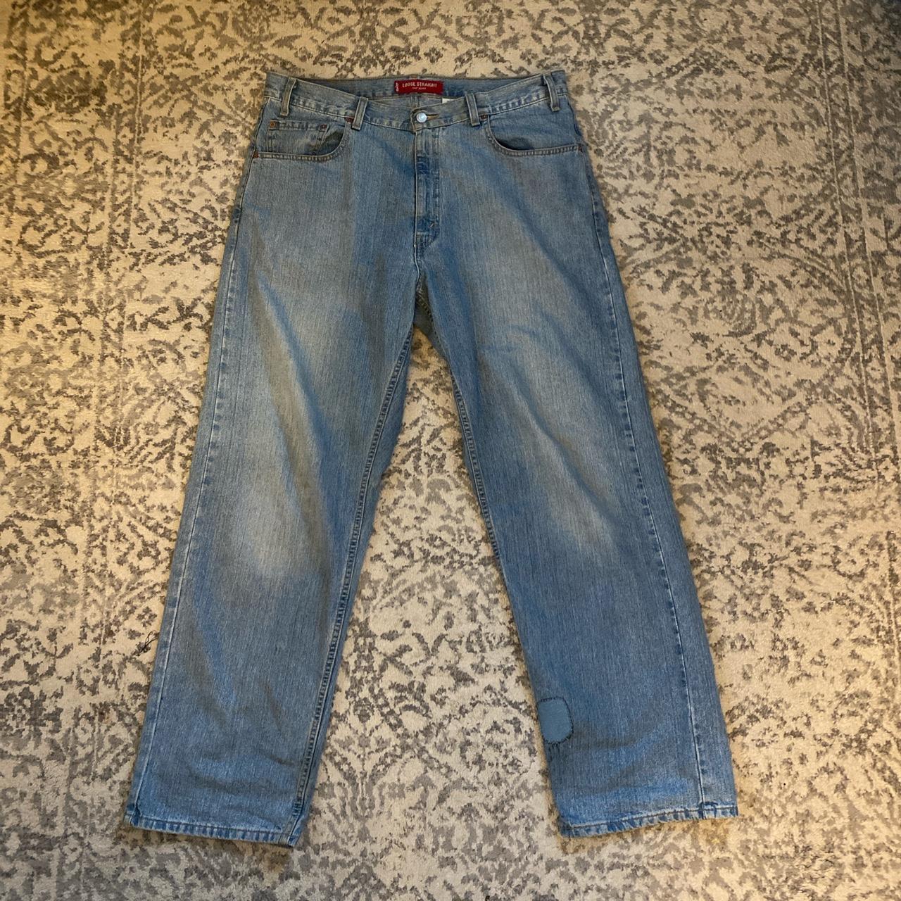 Levi’s loose straight legged 569 light wash jeans... - Depop