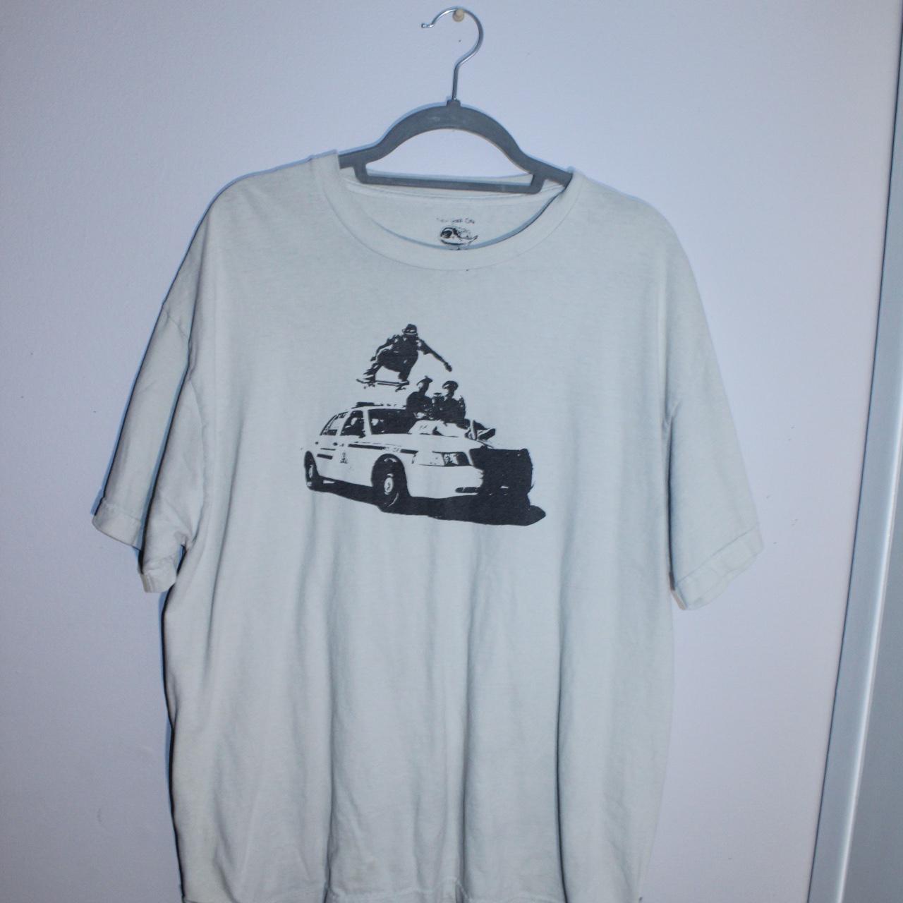 rare yellow rat bastard jumping over cop car t shirt... - Depop