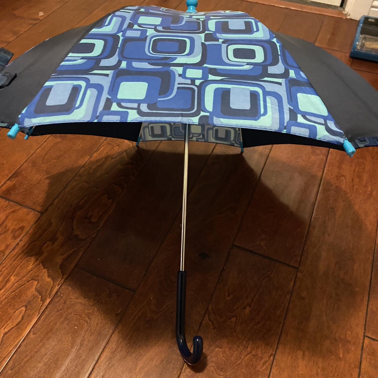 Kids Blue Patterned Umbrella A very small blue... - Depop
