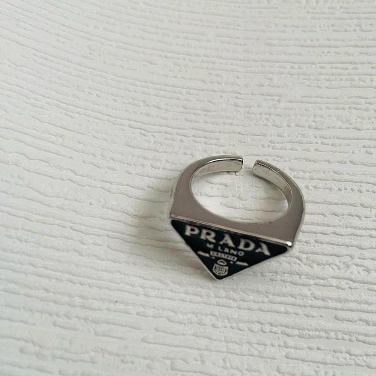 Reworked vintage Prada ring fit size 5-7 adjustable... - Depop