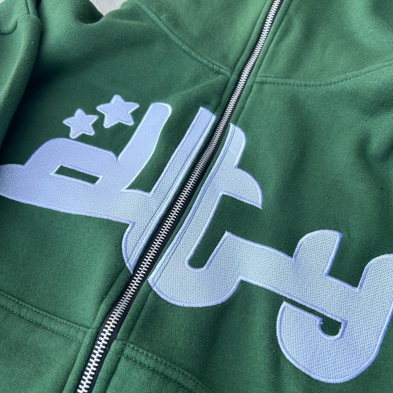 y2k forest green on white divide the youth logo full... - Depop