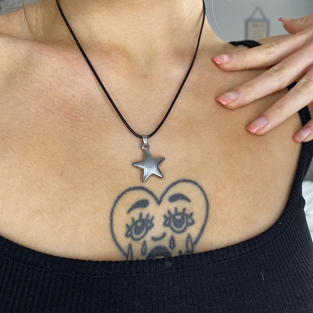 CHUNKY STAR NECKLACE • black rope chain; the metal... - Depop