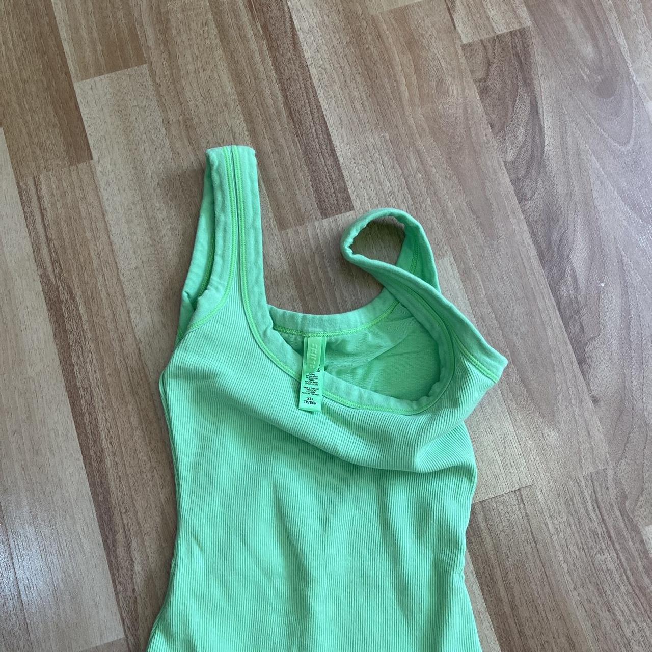 Skims neon green bodysuit, never worn but saw small... - Depop