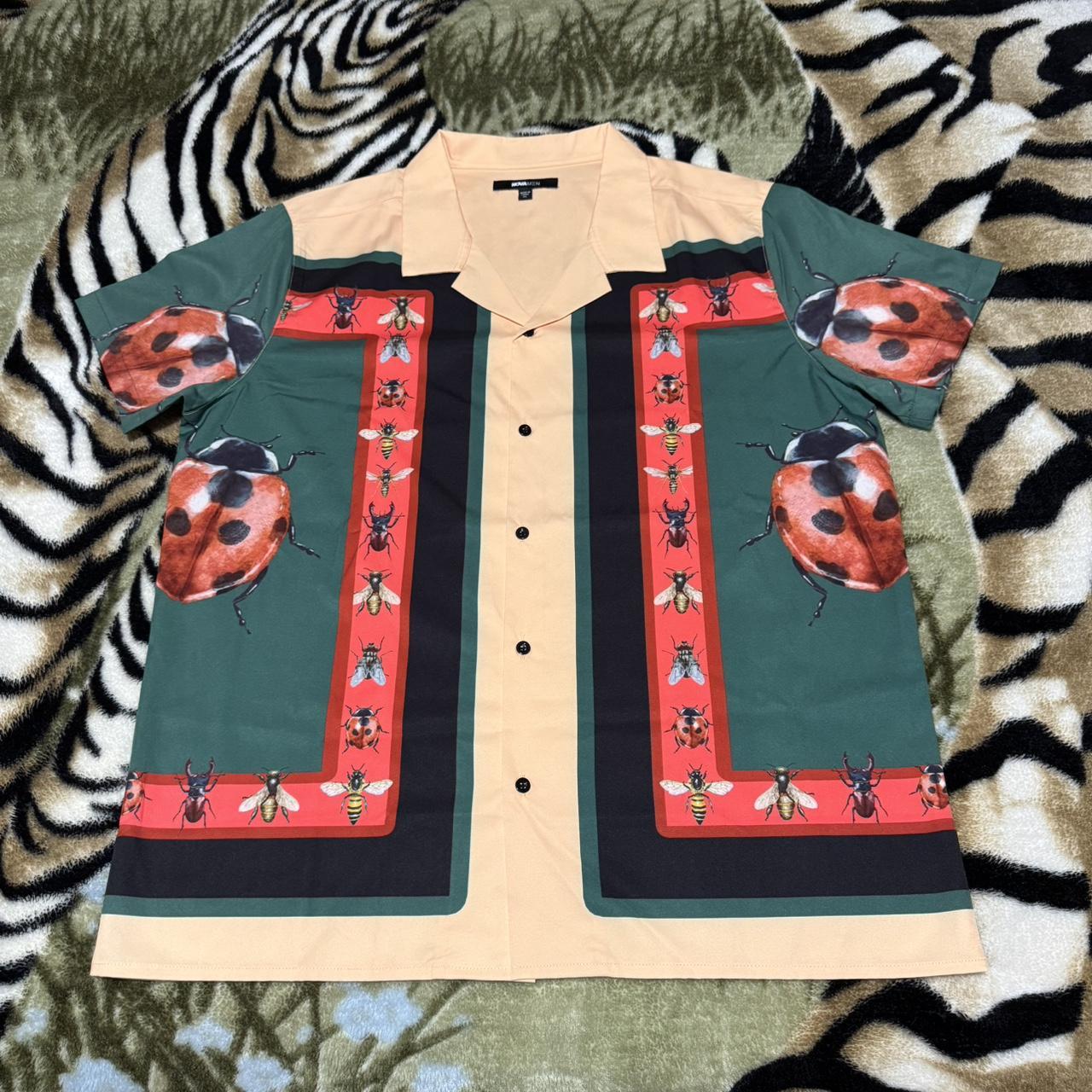 Green and red silk button-up shirt with a relaxed... | Depop