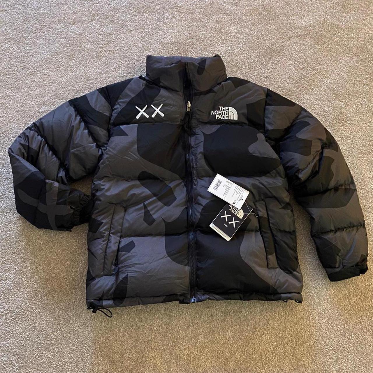 north face X kaws puffer jacket new with tags and... - Depop