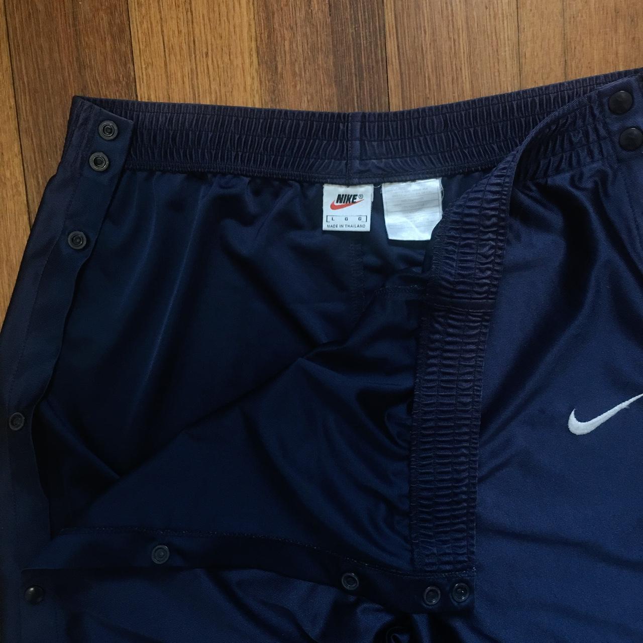 Vintage (circa 1999) Nike snap button track pants... - Depop