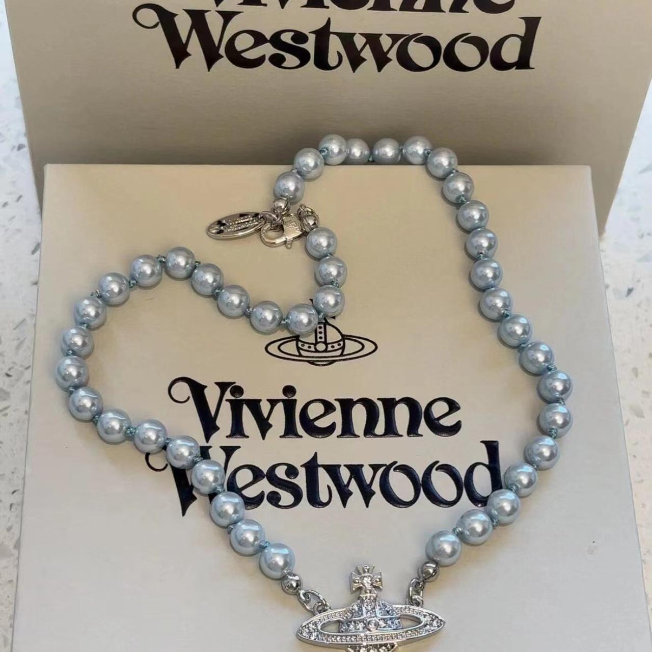 Vivian Blue Saturn Pearl Necklace | Depop