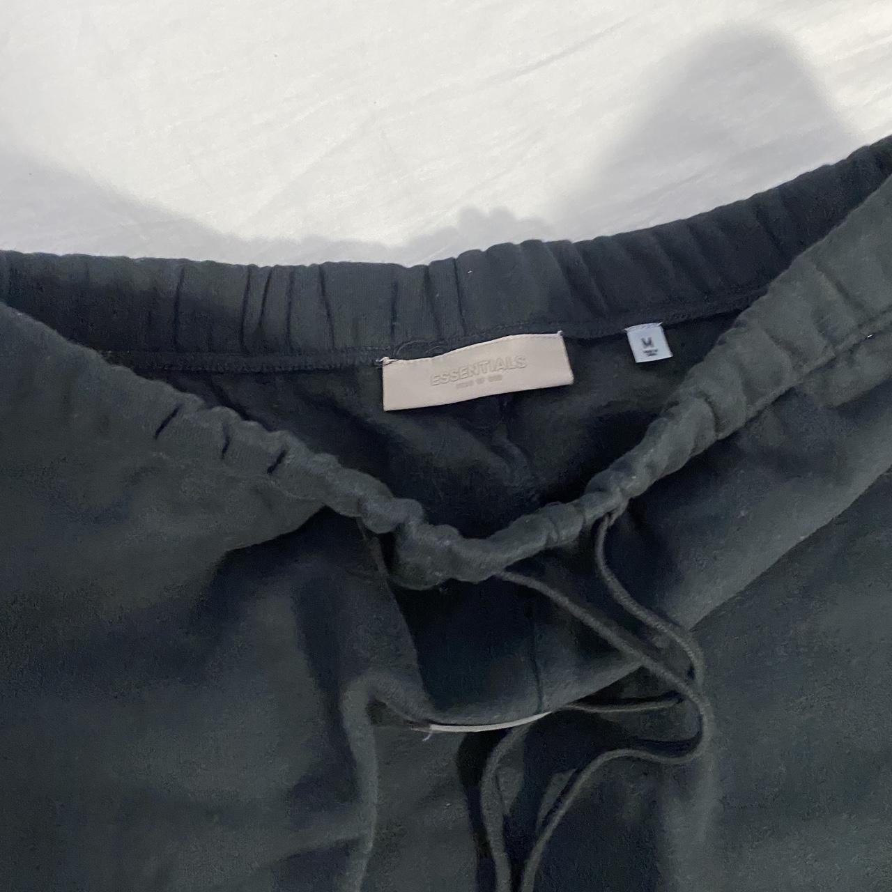 Black ESSENTIALS Track Pants - Depop