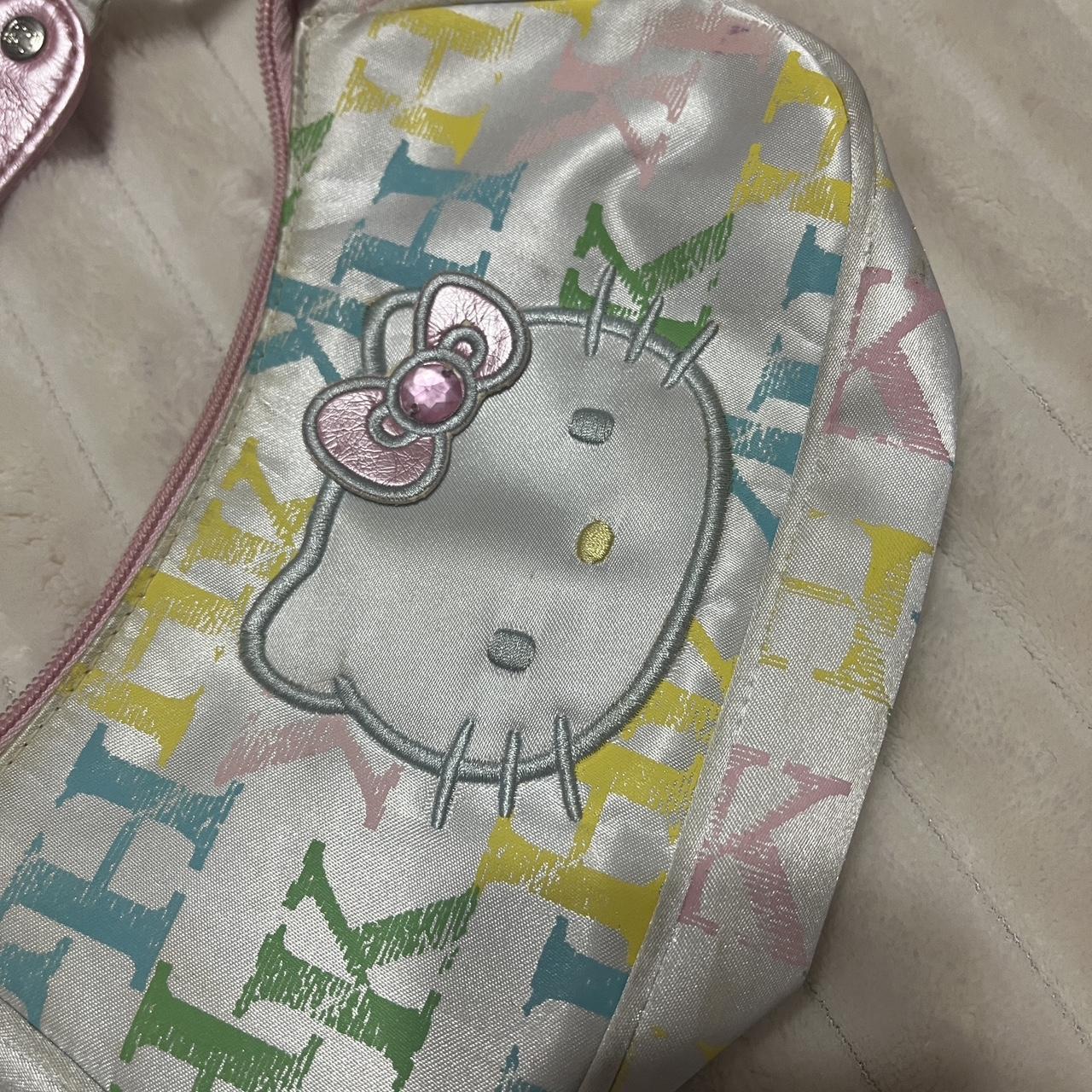 Hello Kitty monogram purse . Super cute in good... - Depop
