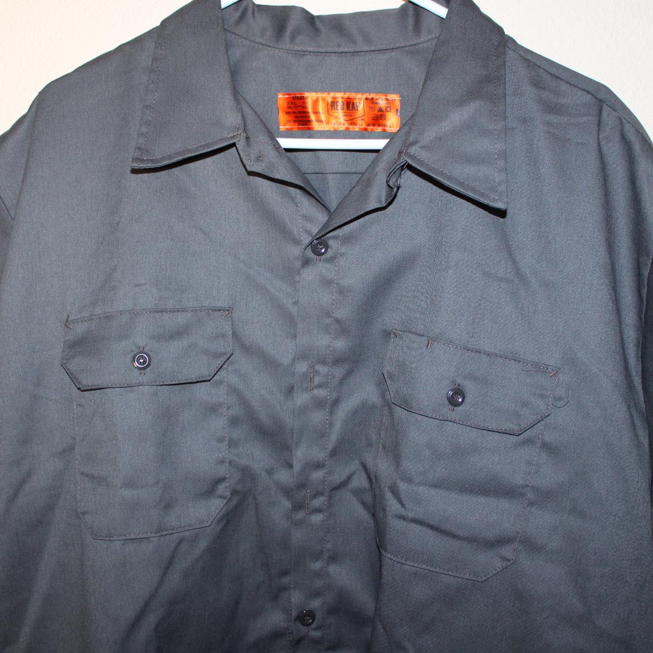 A work shirt with pocket flaps and left pocket... - Depop