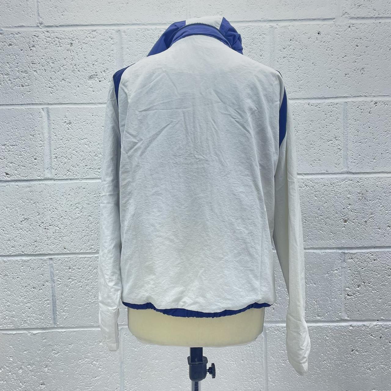 FILA VINTAGE SHELL JACKET PULLOVER HOODIE SPELLOUT... - Depop