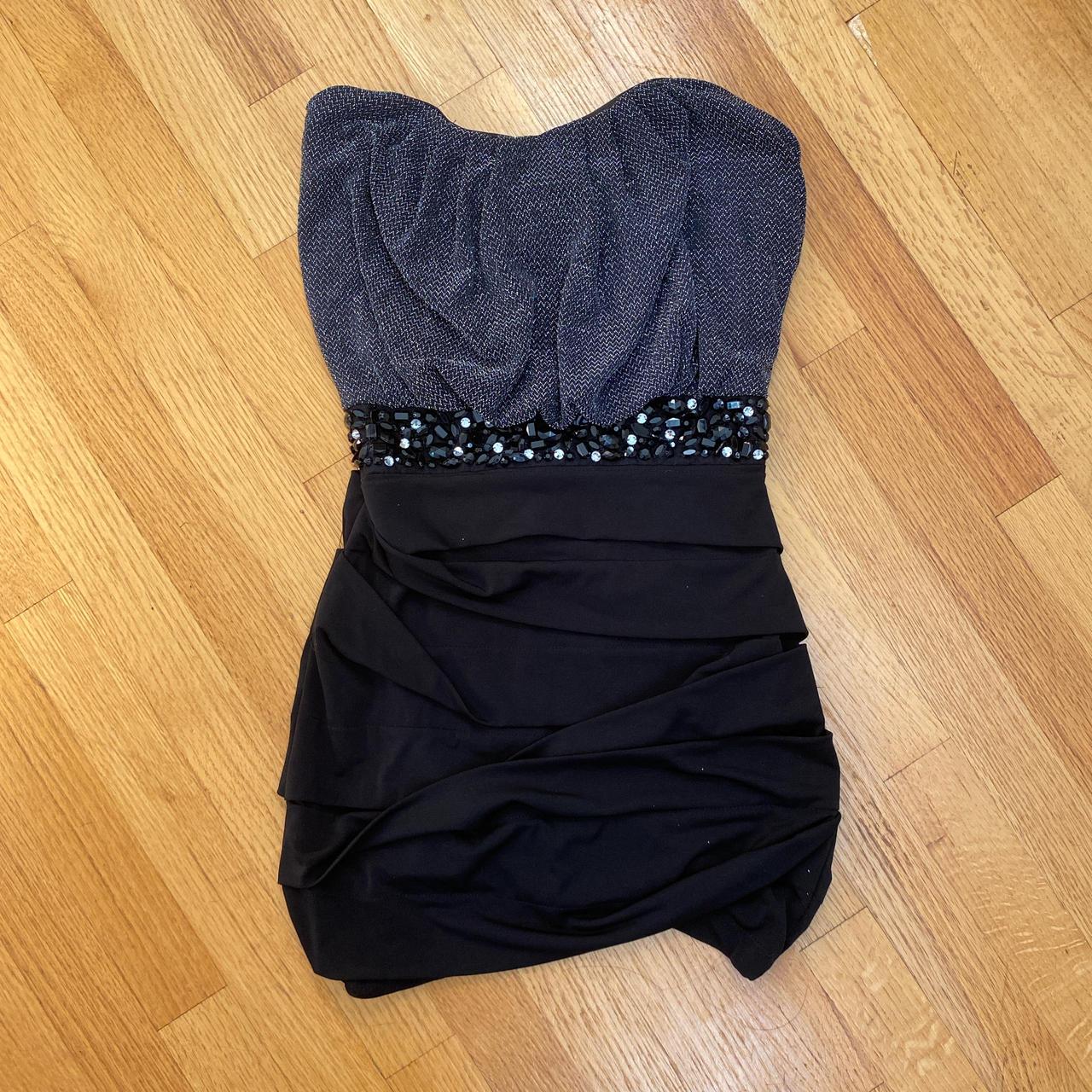 Cute black mini dress with ruffle at the bottom and... - Depop