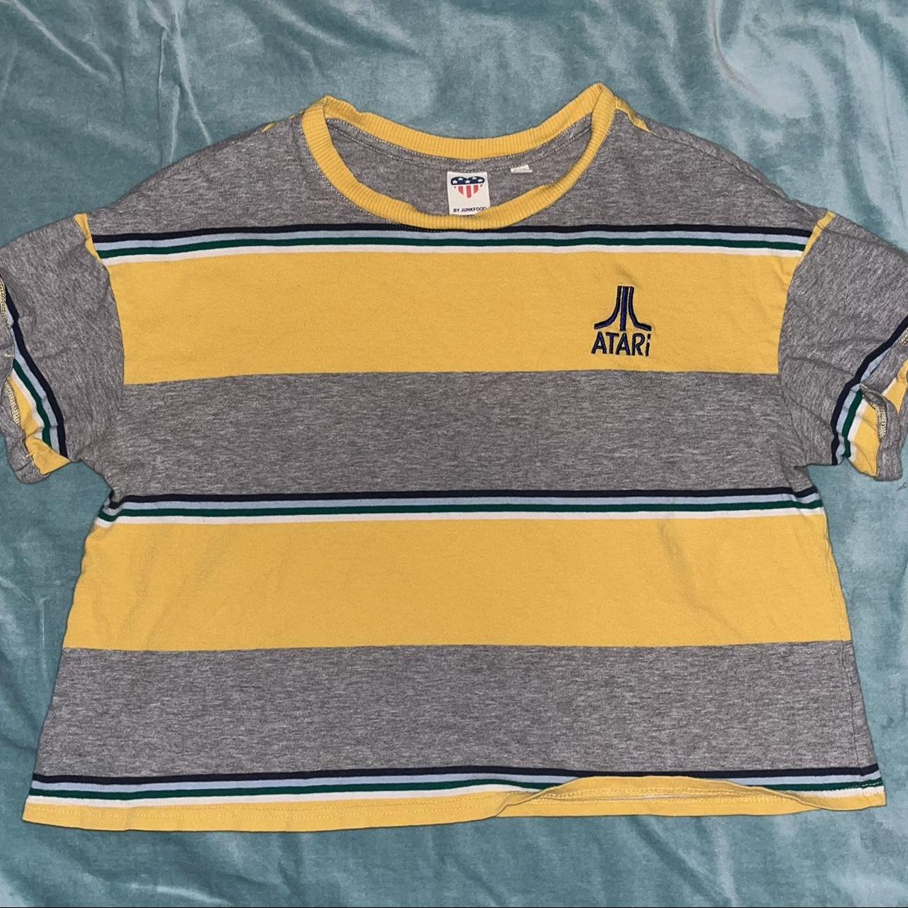 Junk Food Clothing Atari Stripped Shirt Size... - Depop