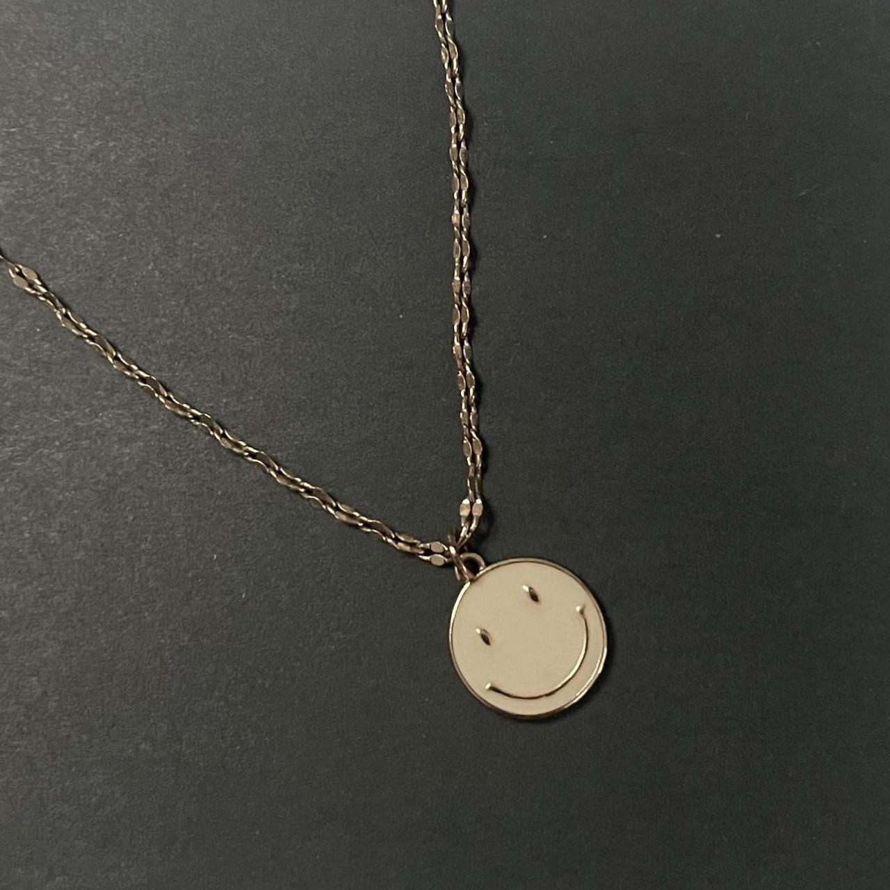 brandy melville smiley necklace -worn once or twice... - Depop