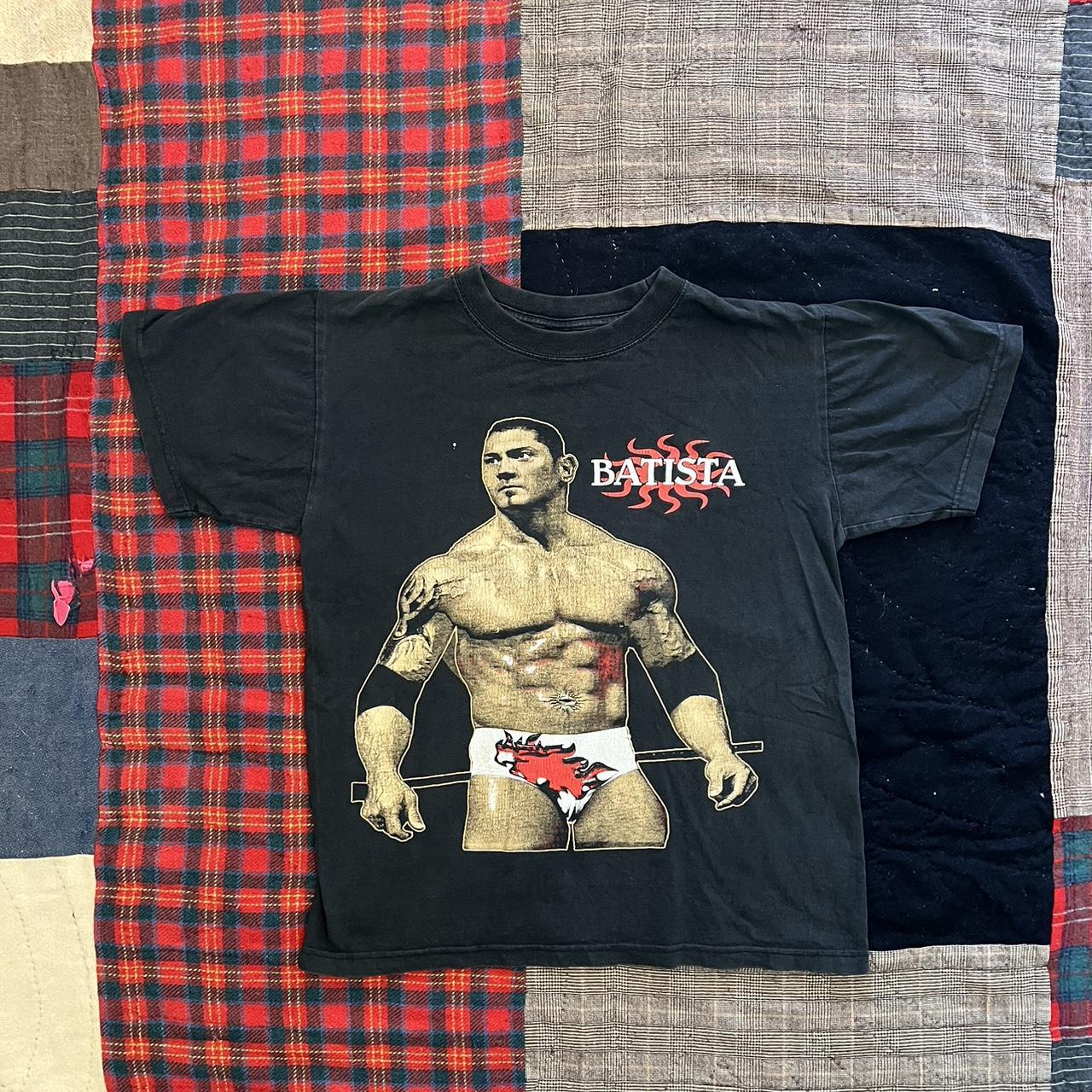 vintage WWE batista wrestler shirt. cracking in... - Depop